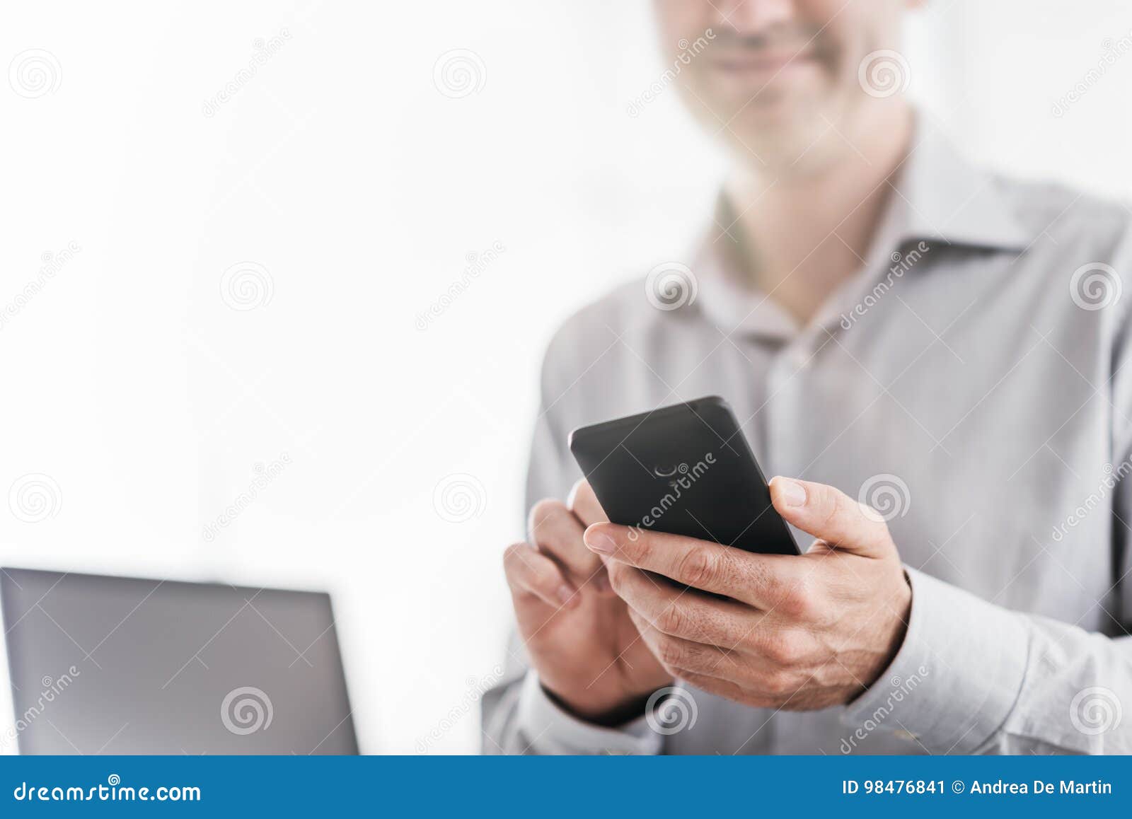 Businessman Using a Smartphone in His Office Stock Image - Image of ...