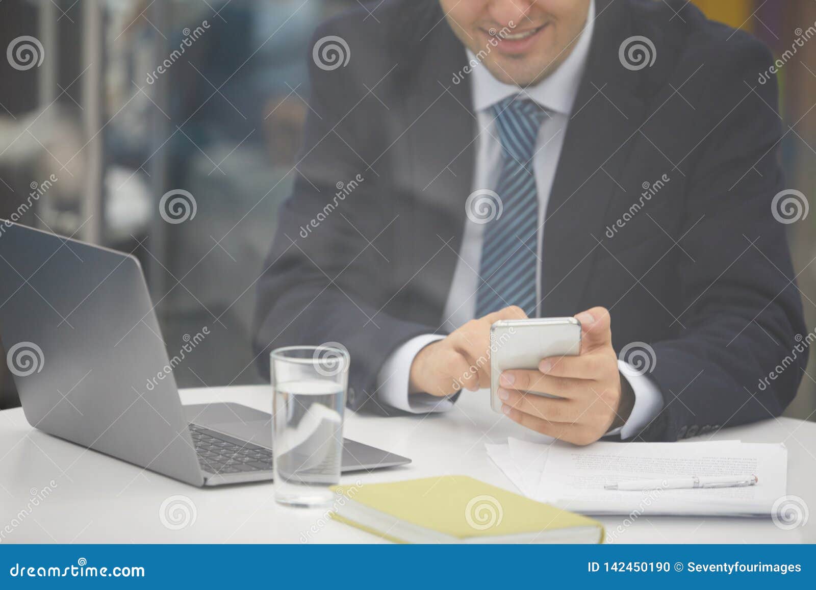 Businessman Using Smartphone at Workplace Stock Photo - Image of ...