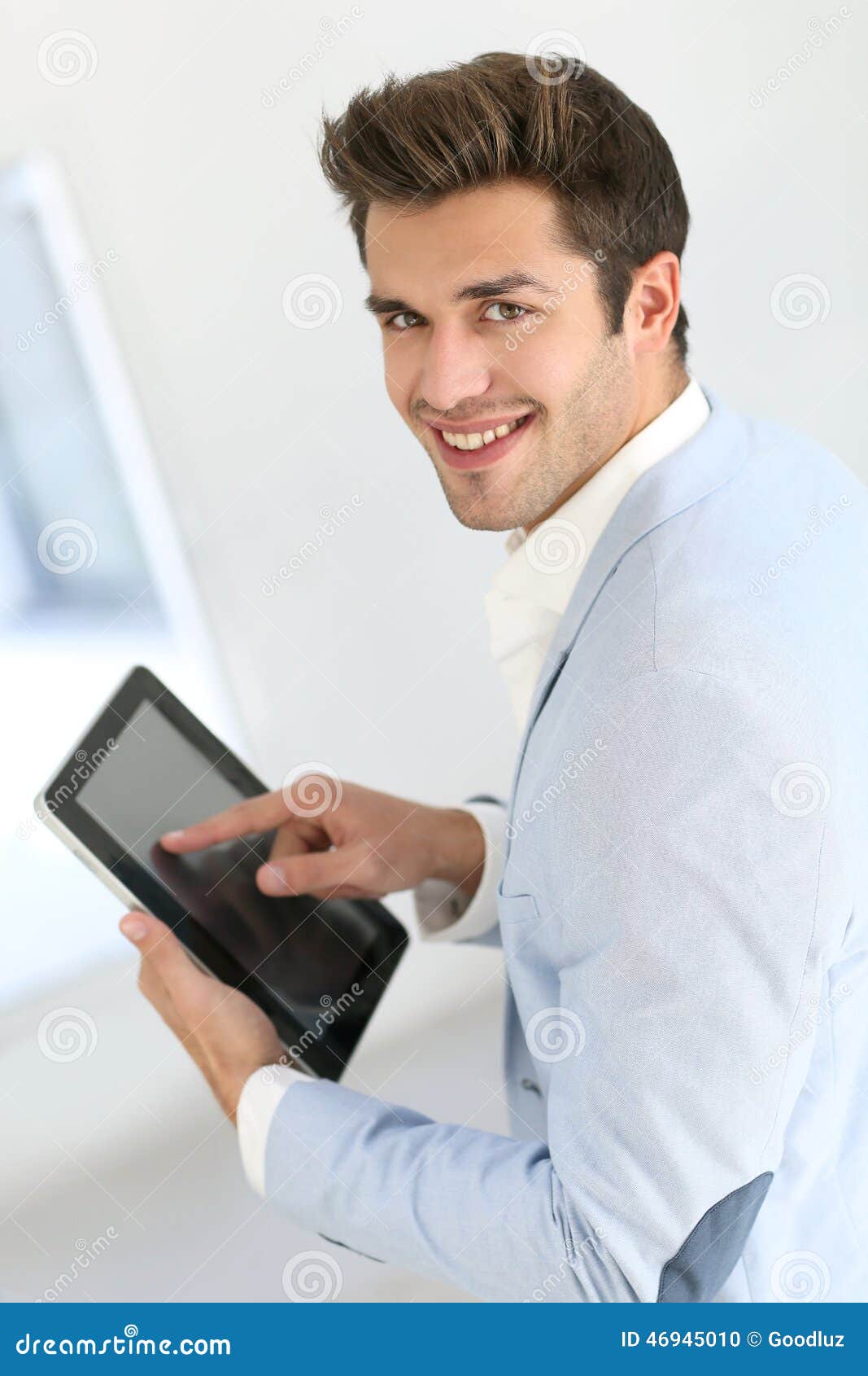 Businessman using tablet stock photo. Image of websurfing - 46945010 Businessman using tablet stock photo. Image of websurfing - 46945010