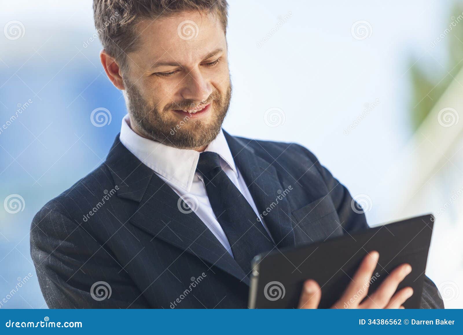 Businessman Using Tablet Computer Stock Photo - Image of outside ...