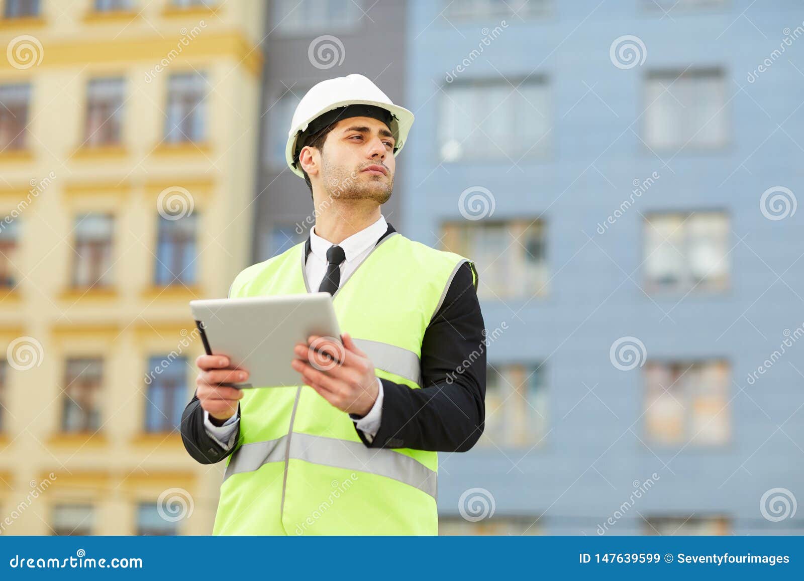 Businessman Using Tablet at Construction Site Stock Image - Image of ...