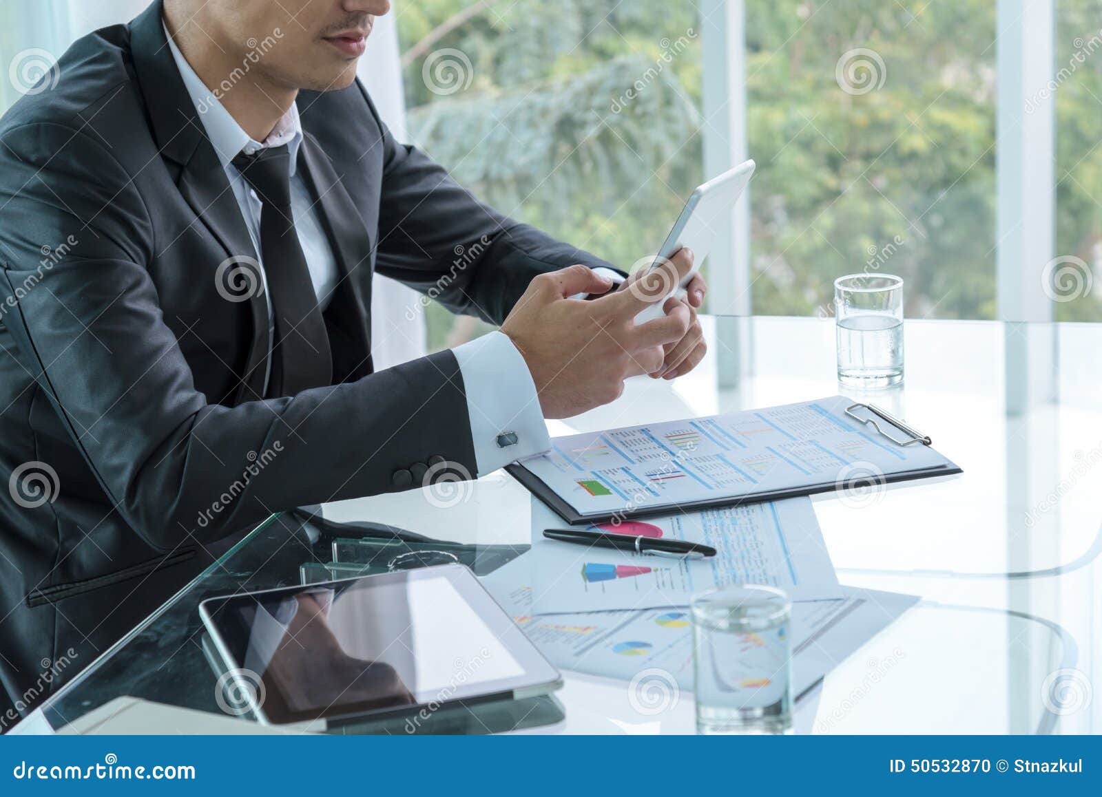 Businessman using tablet stock photo. Image of innovation - 50532870
