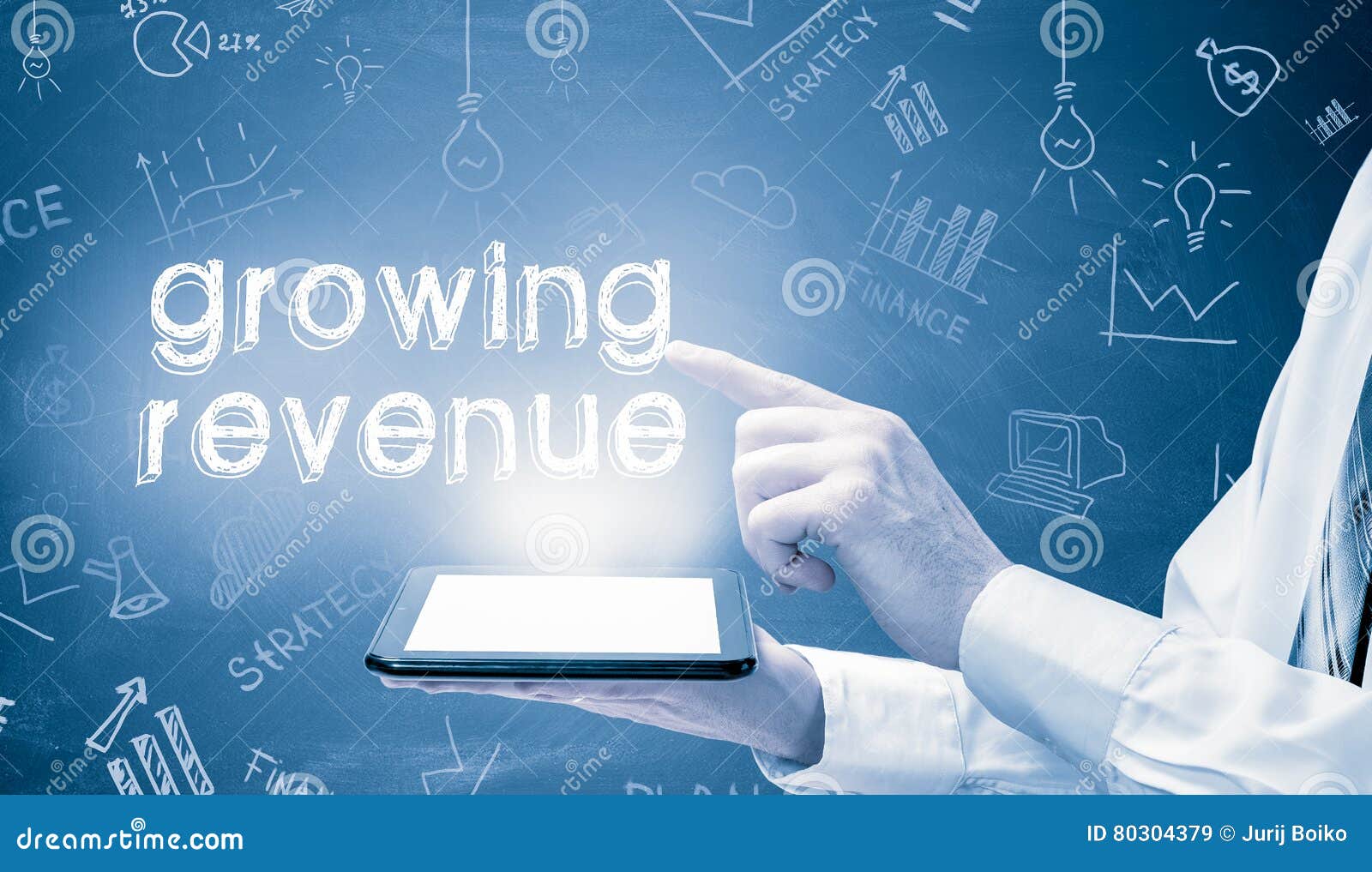 Businessman is Using Tablet Pc and Selecting Growing Revenue Stock ...