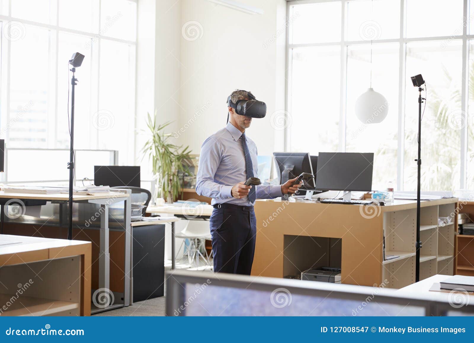 Businessman Using VR Technology in an Office, Side View Stock Image ...