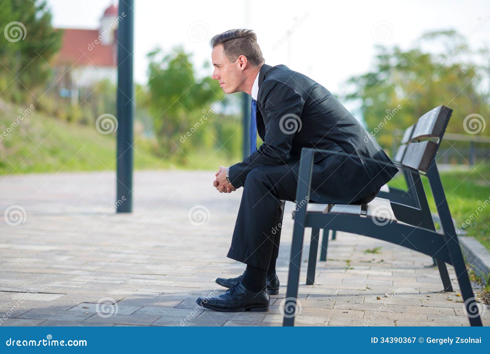 Businessman Waiting On A Bench In Park Stock Image - Image: 34390367