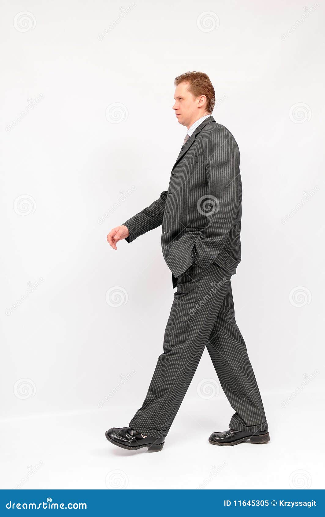 Businessman walking stock image. Image of clothing, elegant - 11645305