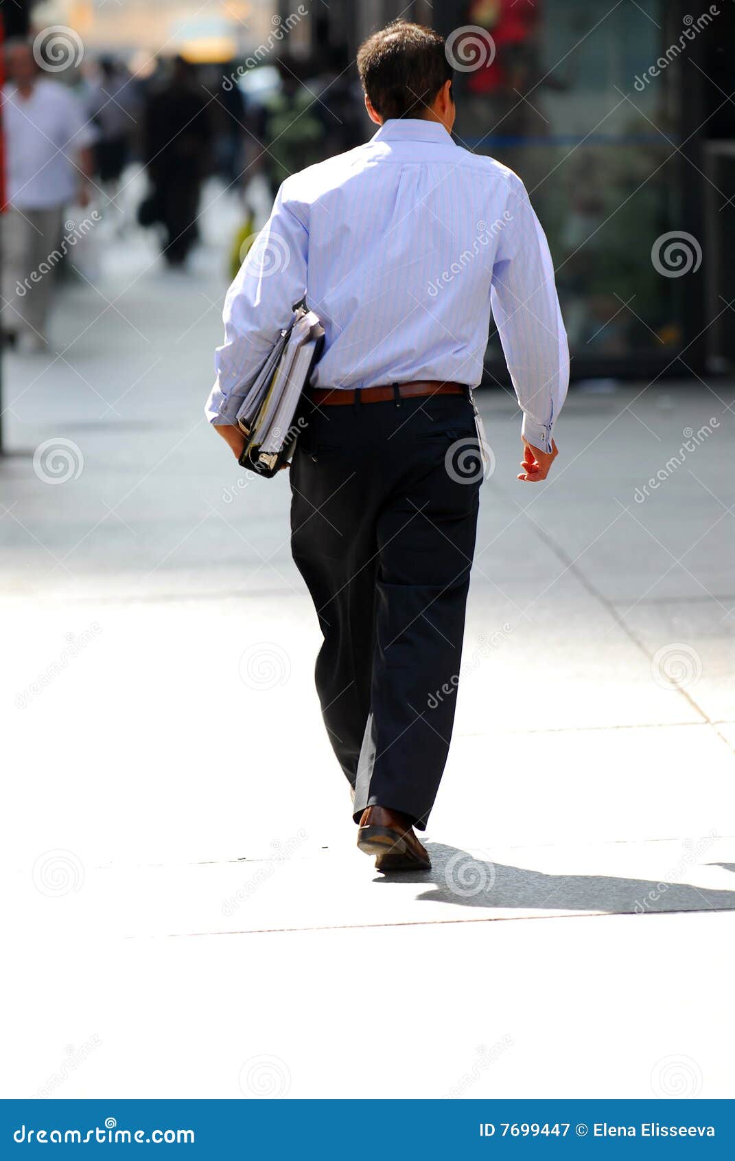Businessman walking stock image. Image of moving, sidewalk - 7699447