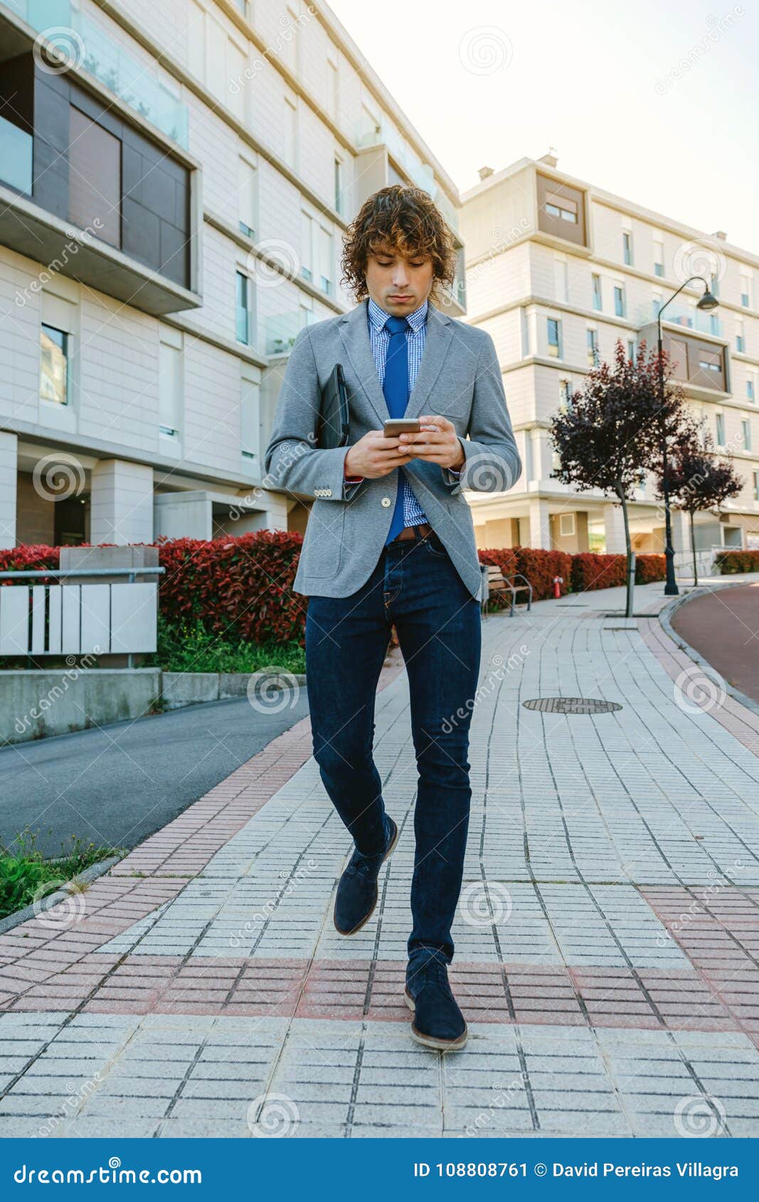 Businessman Walking Down the Street Stock Image - Image of architecture ... Businessman Walking Down the Street Stock Image - Image of architecture ...