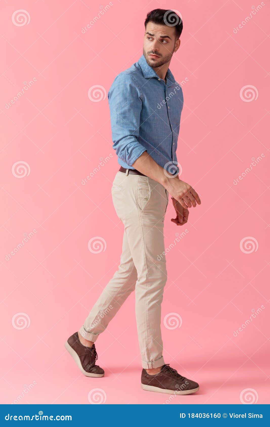 Businessman Walking while Looking Back Over Shoulder Cool Stock Photo ... Businessman Walking while Looking Back Over Shoulder Cool Stock Photo ...