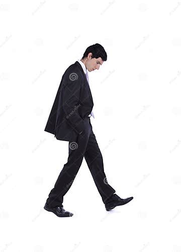 Businessman Walking and Looking Down Stock Photo - Image of motion ...