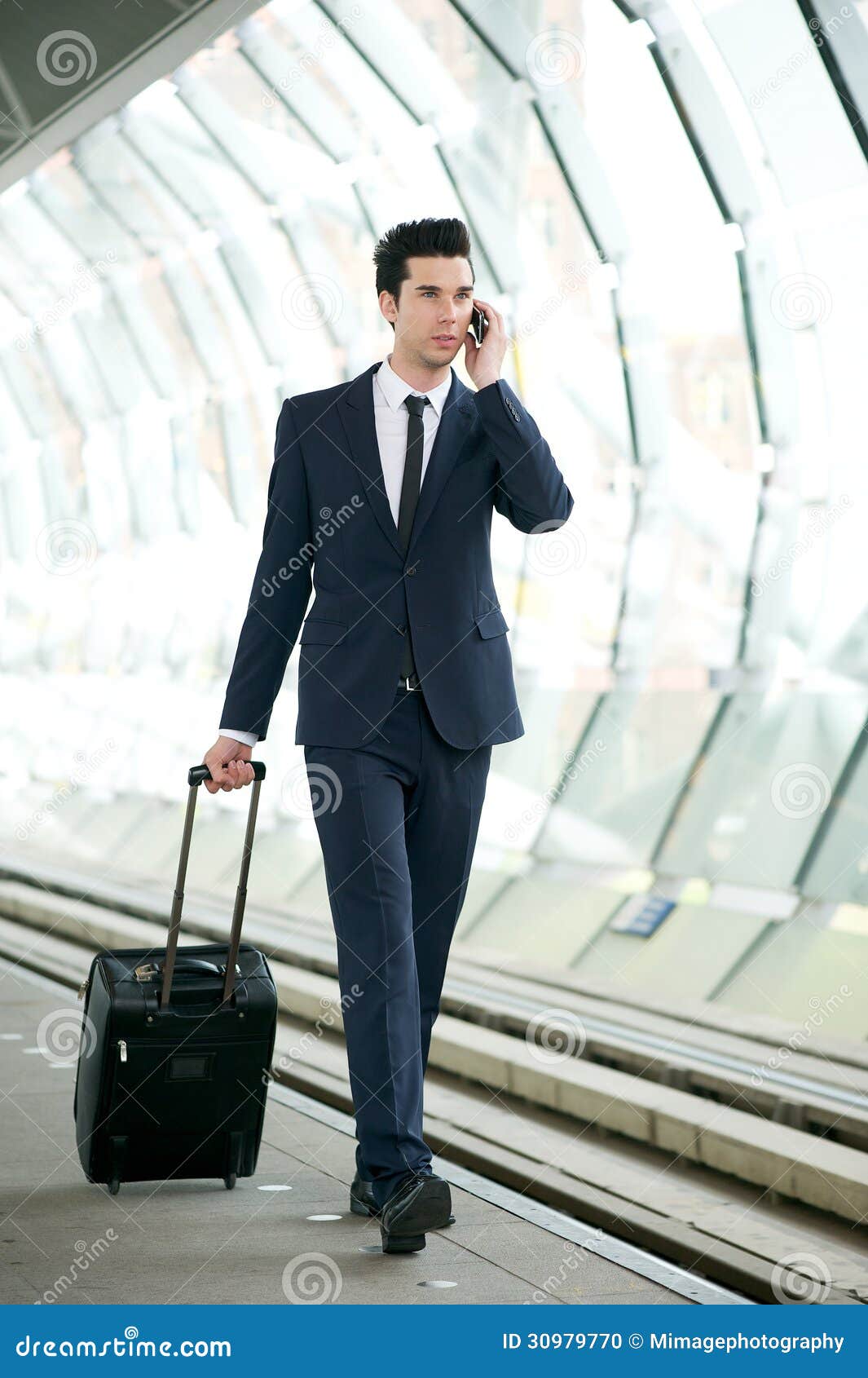 Businessman Walking and Talking on the Phone Stock Photo - Image of ...