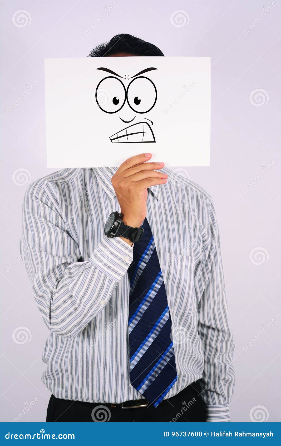 Businessman Wearing Angry Face Mask Stock Photo - Image of young ...