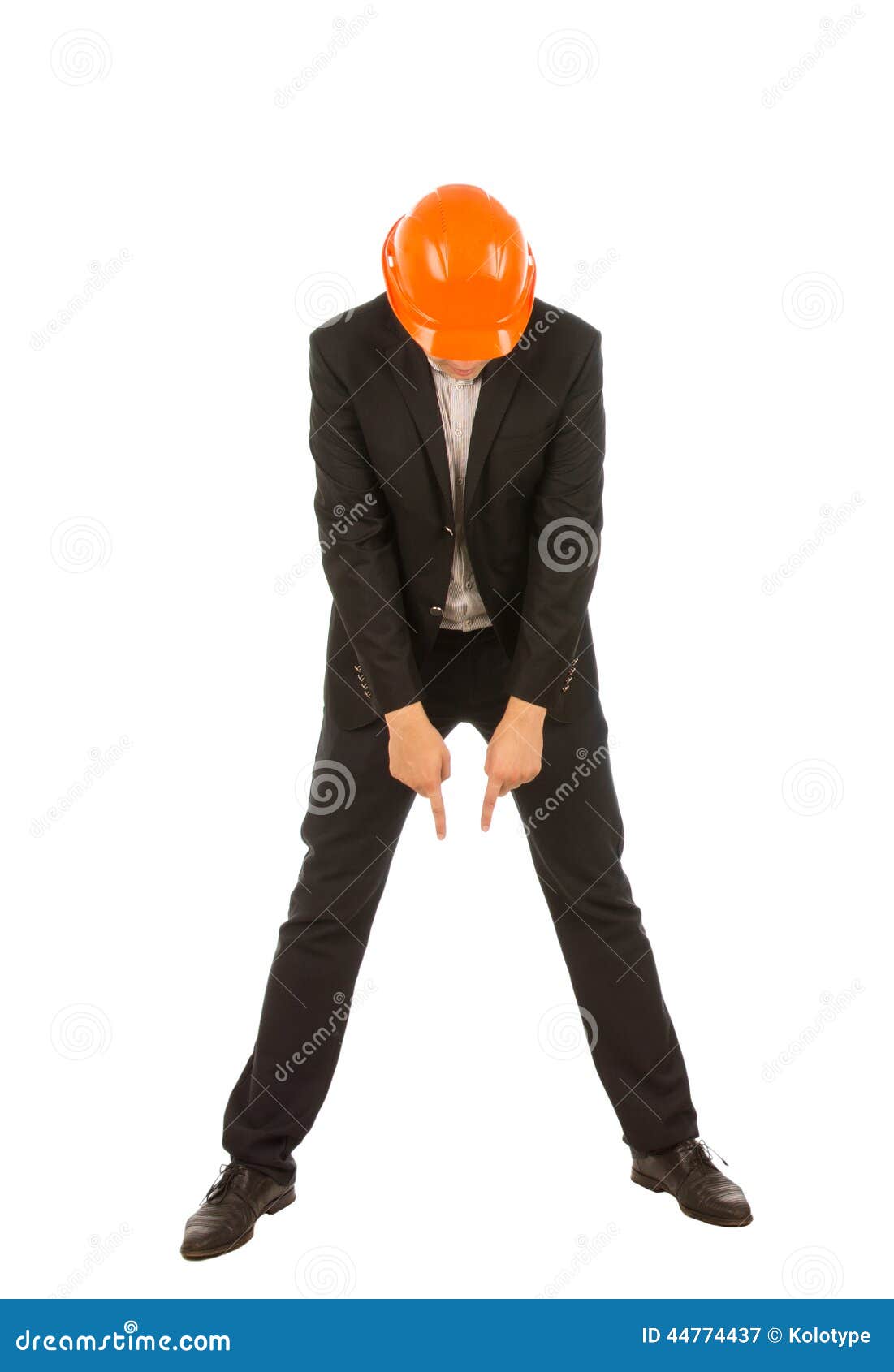 Businessman Wearing Hard Hat Pointing Down Stock Image - Image of body ...