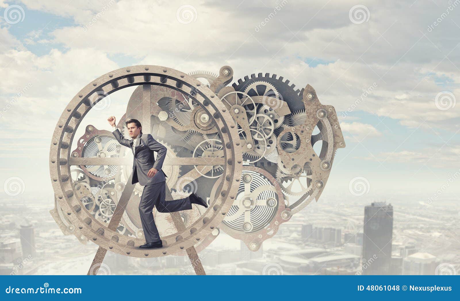 Businessman in wheel stock photo. Image of hardworking - 48061048