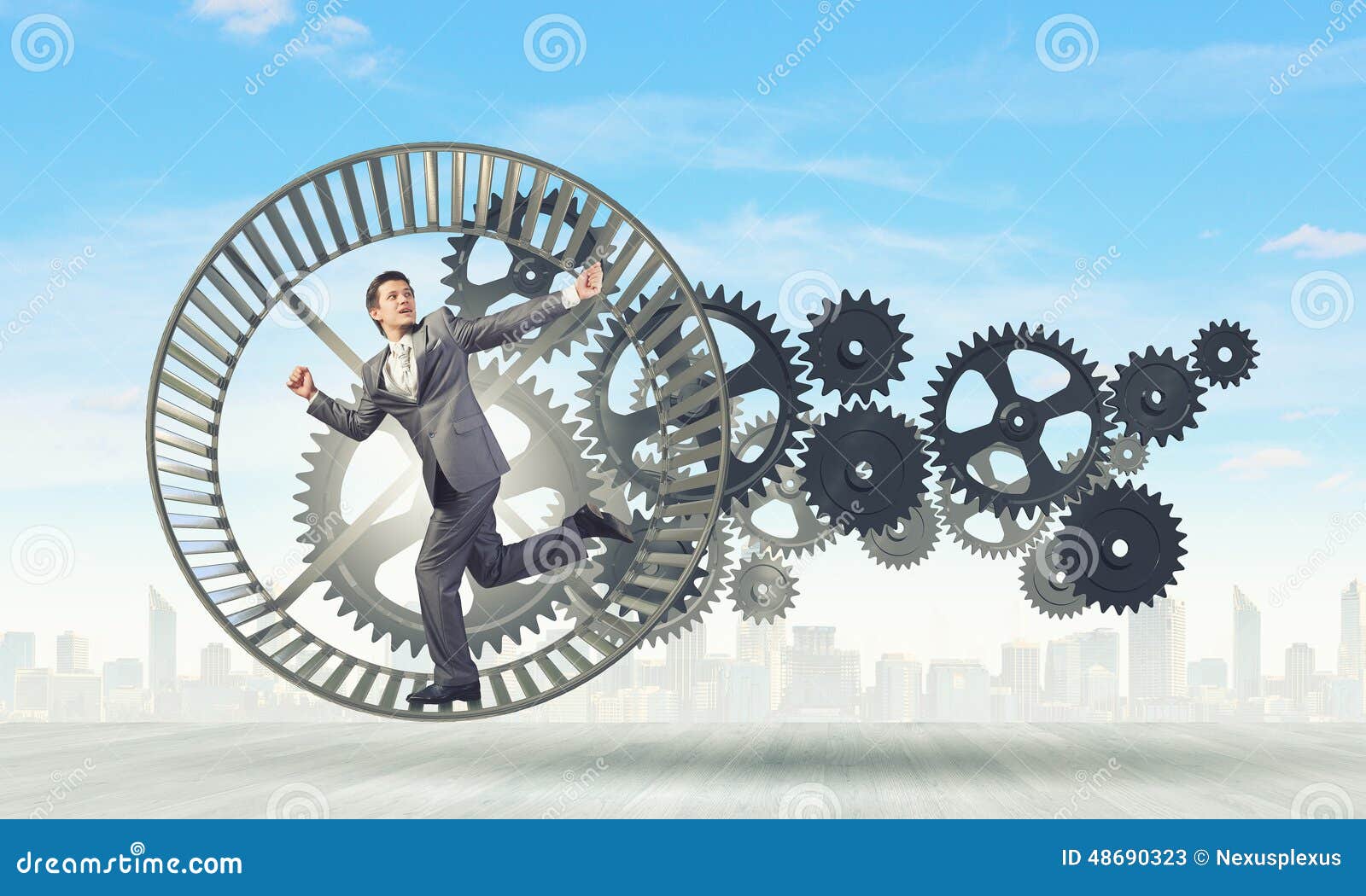 Businessman in wheel stock image. Image of challenge - 48690323