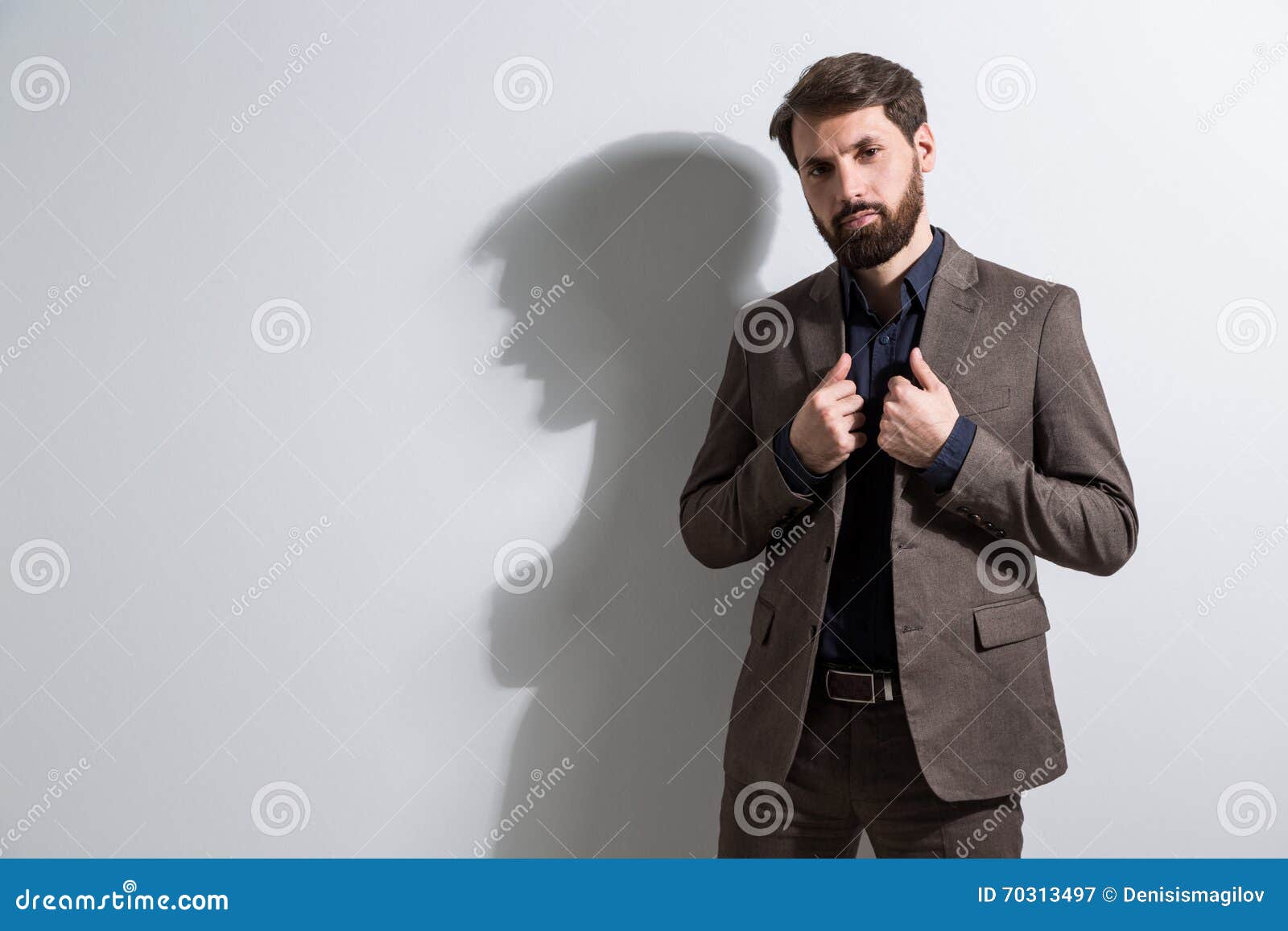Businessman white wall stock image. Image of hands, inside - 70313497