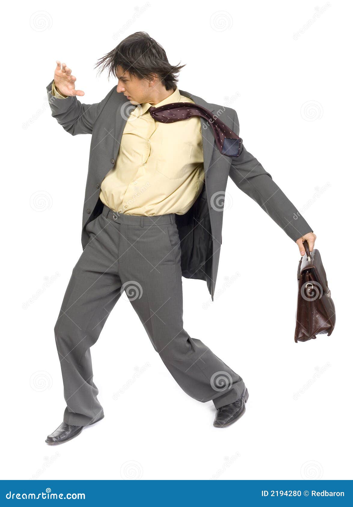 Businessman in the wind stock photo. Image of wind, young - 2194280