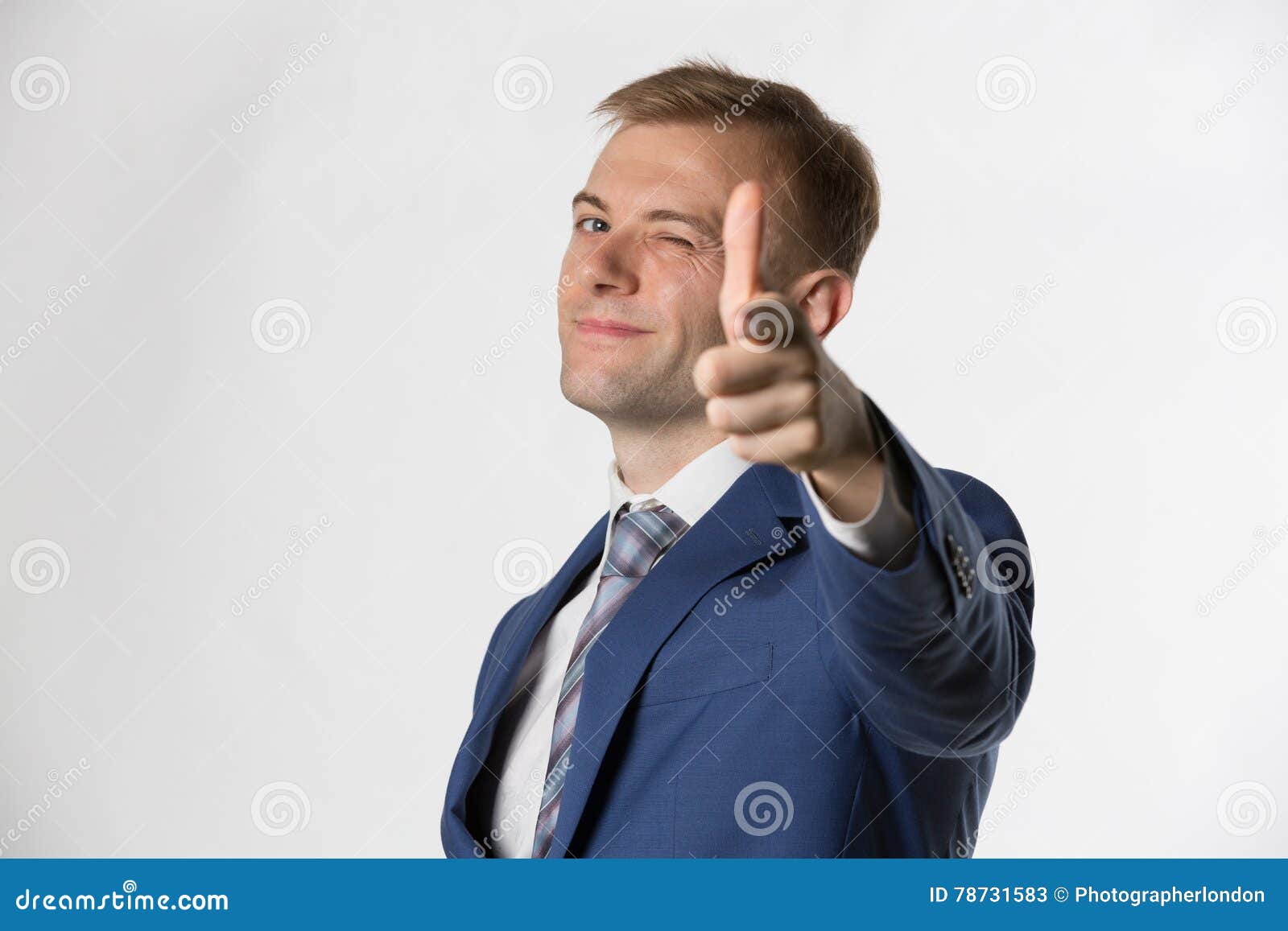 Businessman Winking and Pointing To Camera Stock Image - Image of adult ...