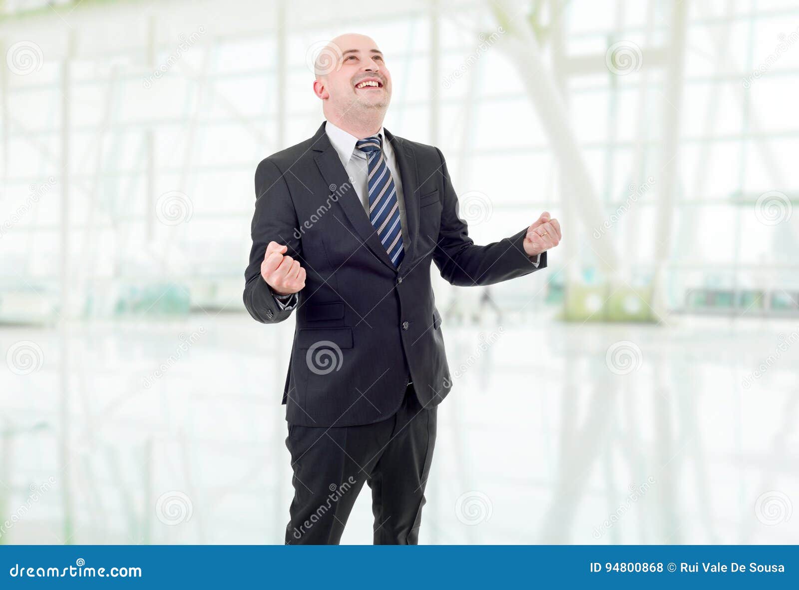 Businessman winning stock photo. Image of victory, staring - 94800868