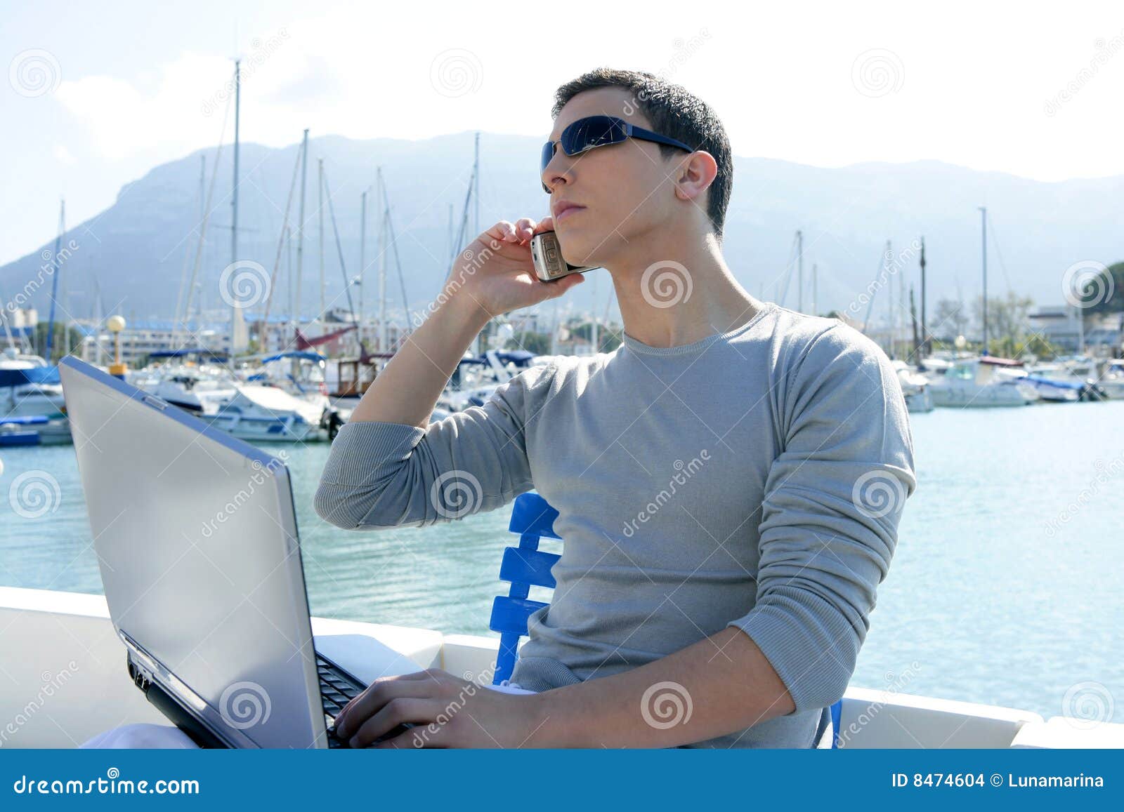 Businessman Working with Computer on a Boat Stock Photo - Image of ...