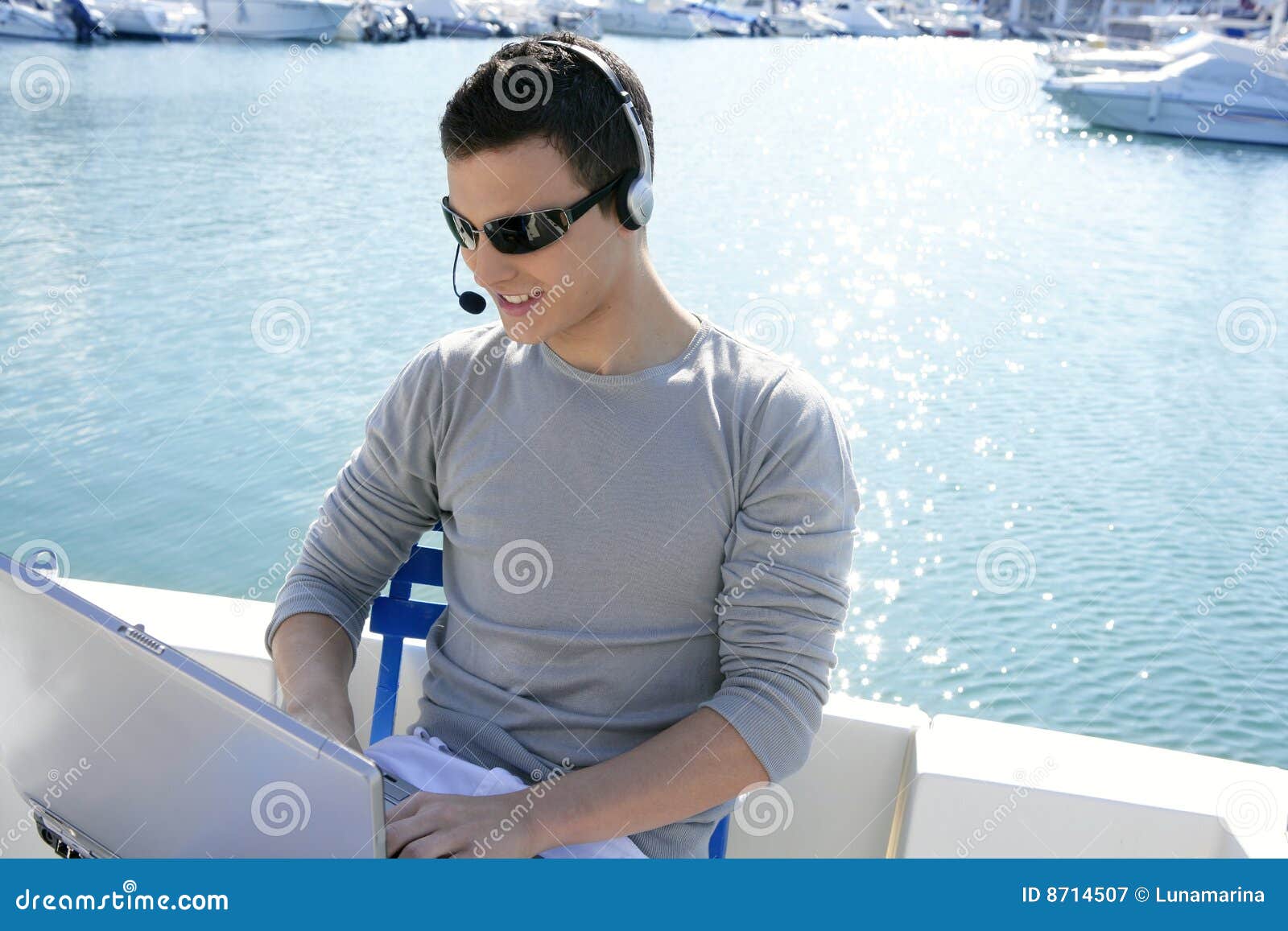 Businessman Working with Computer on a Boat Stock Image - Image of ...
