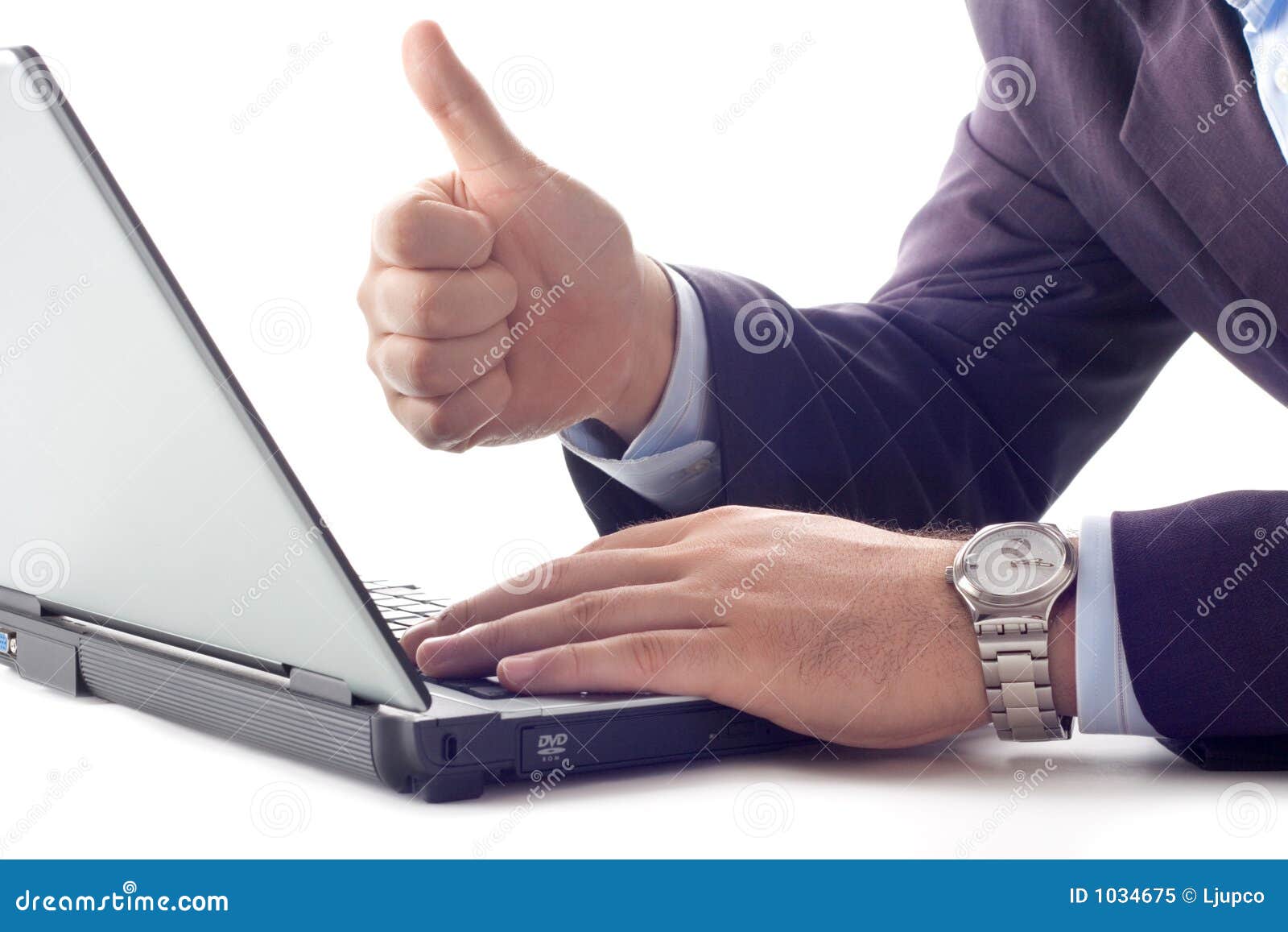 Businessman Working On A Computer With His Thumb Up Stock Image - Image ...