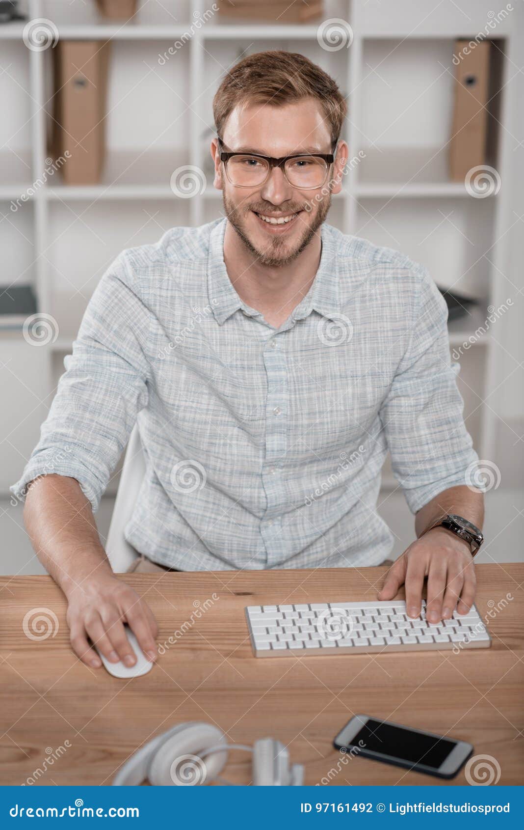 Businessman Working with Computer and Sitting at Workplace while ...