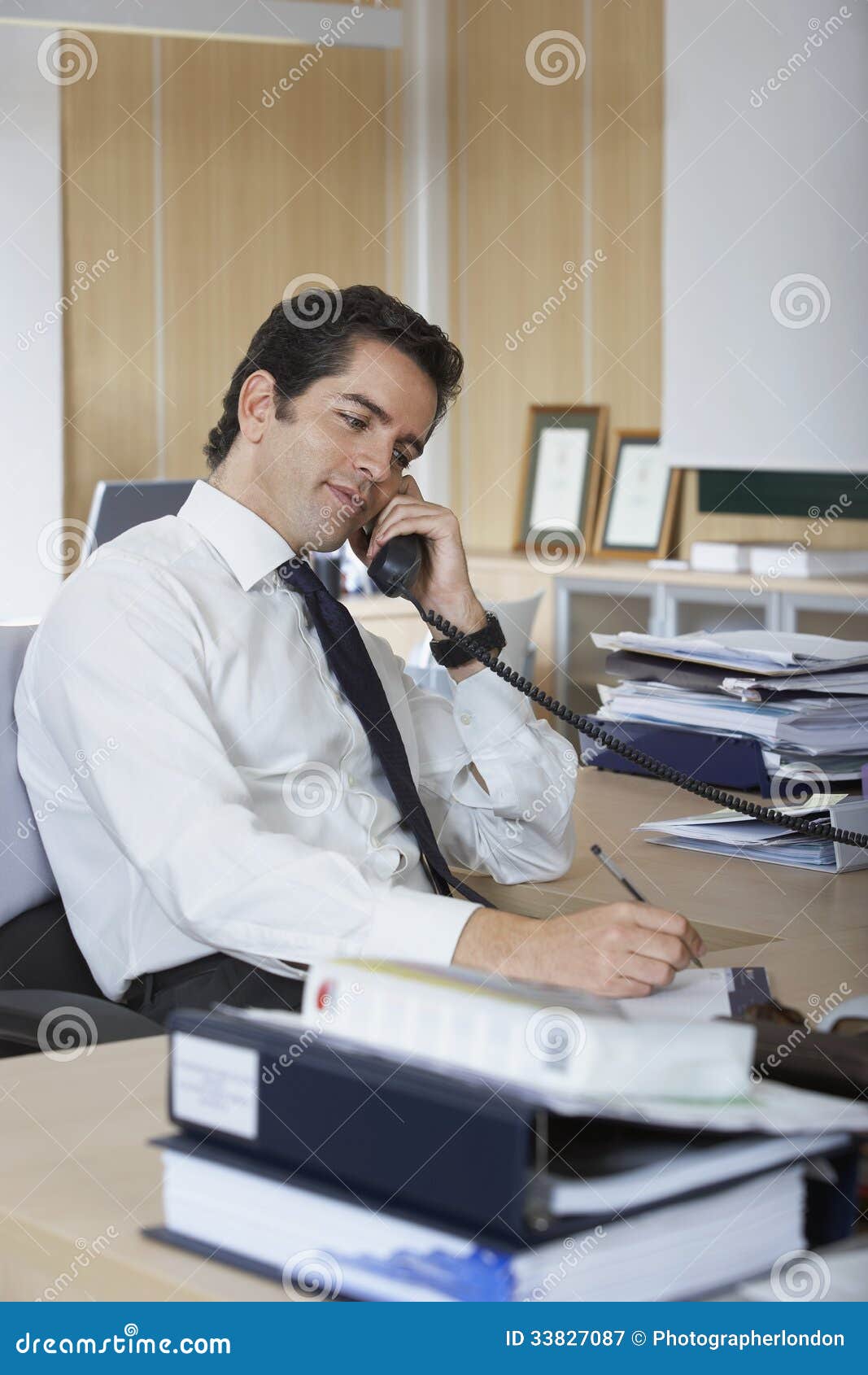 Businessman Working at Desk in Office Stock Image - Image of ...