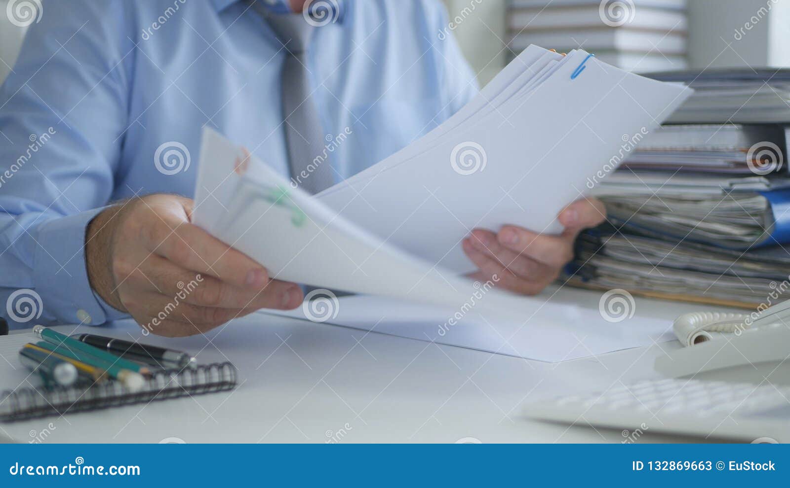 Businessman Working with Financial Documents in Accounting Office Stock ... Businessman Working with Financial Documents in Accounting Office Stock ...