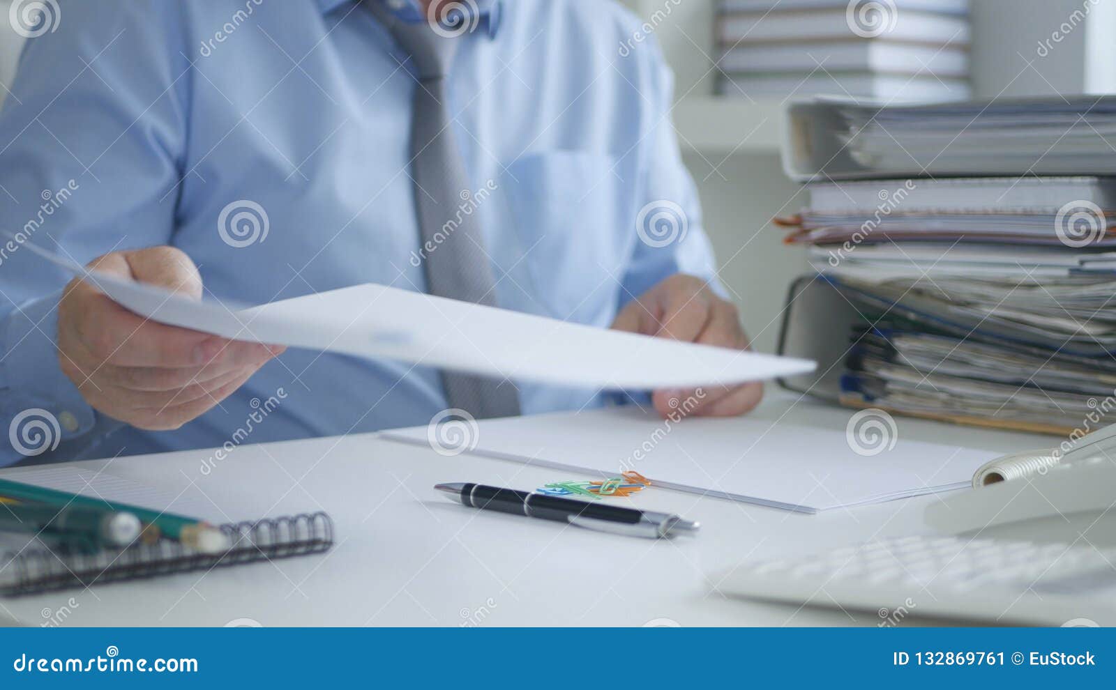 Businessman Working with Financial Documents in Accounting Office Stock ... Businessman Working with Financial Documents in Accounting Office Stock ...