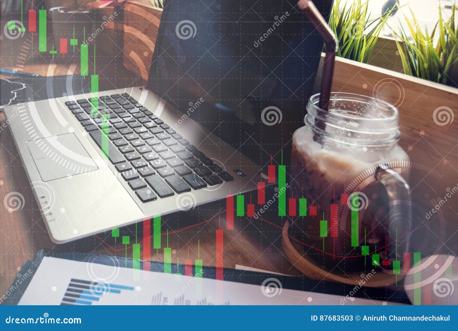 Businessman is Working with His Computer in Coffee Shop with Stock ...