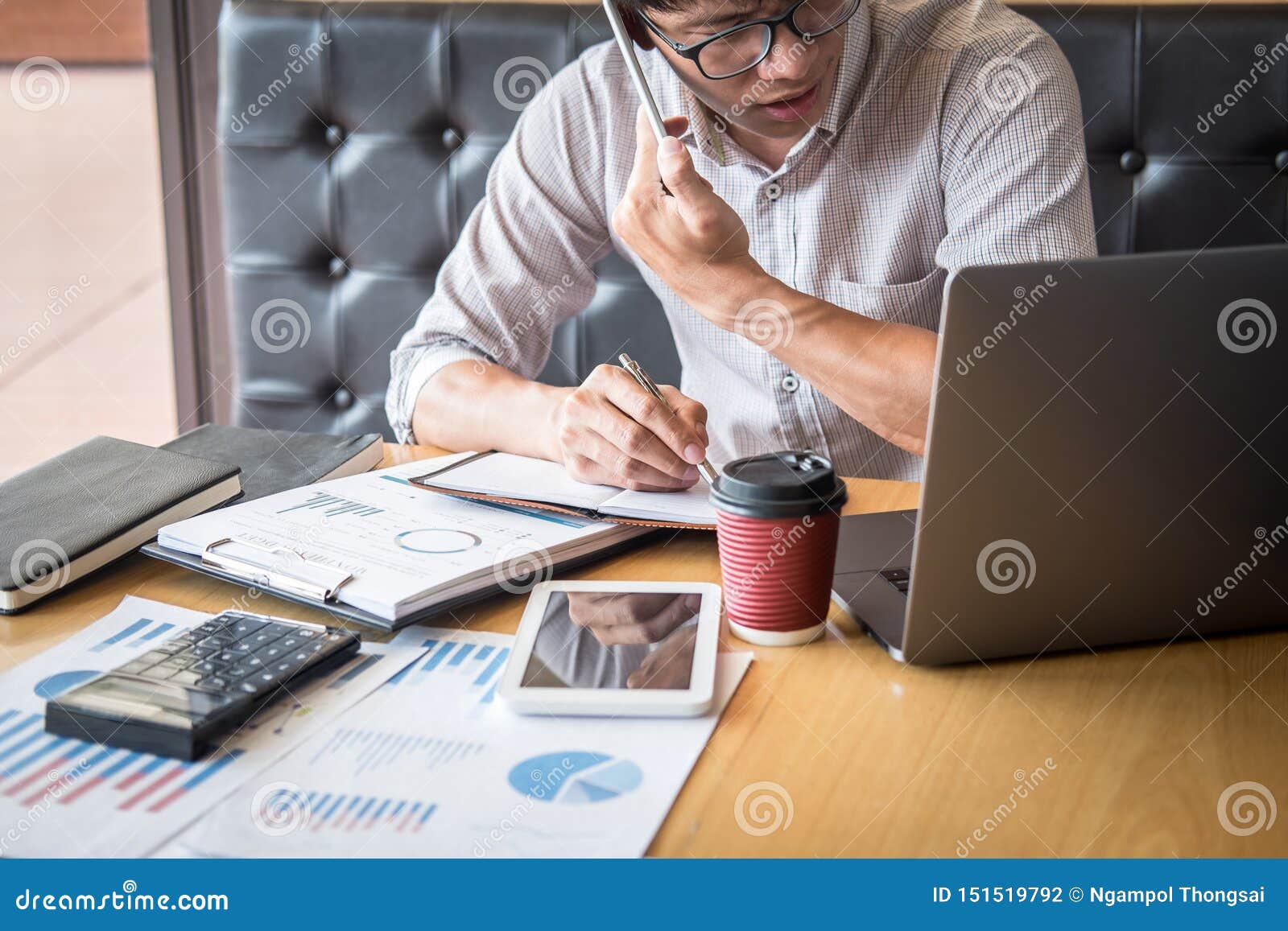 Businessman Working Investment Project on Laptop Computer with Report ...