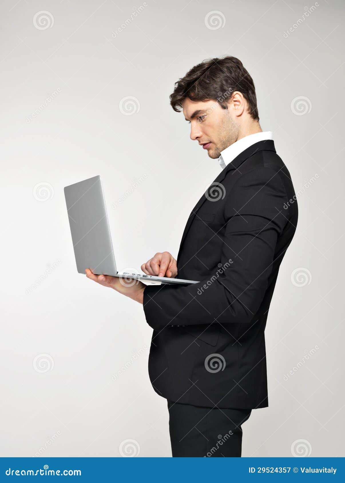 Businessman Working on Laptop in Black Suit Stock Image - Image of ...