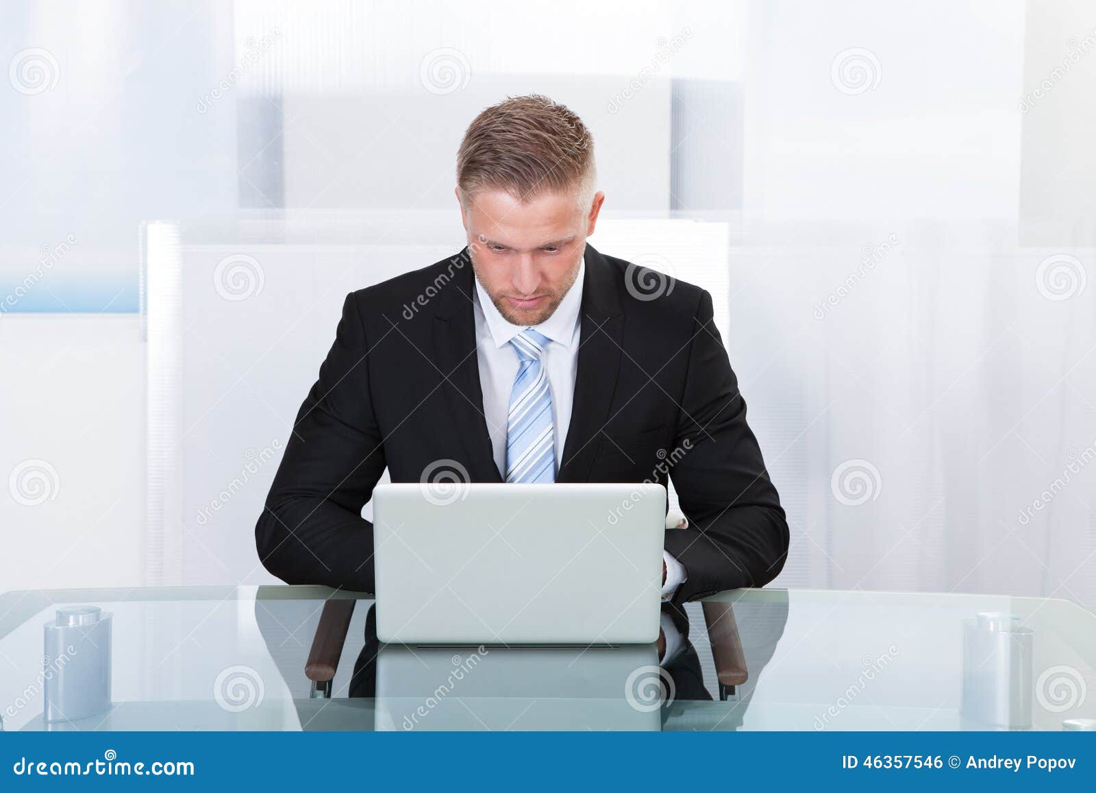 Businessman Working at Laptop Stock Photo - Image of computer ...