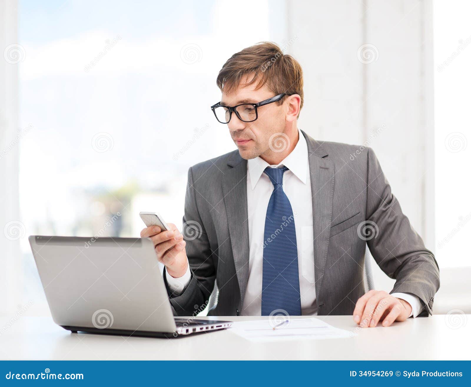Businessman Working with Laptop and Smartphone Stock Image - Image of ...