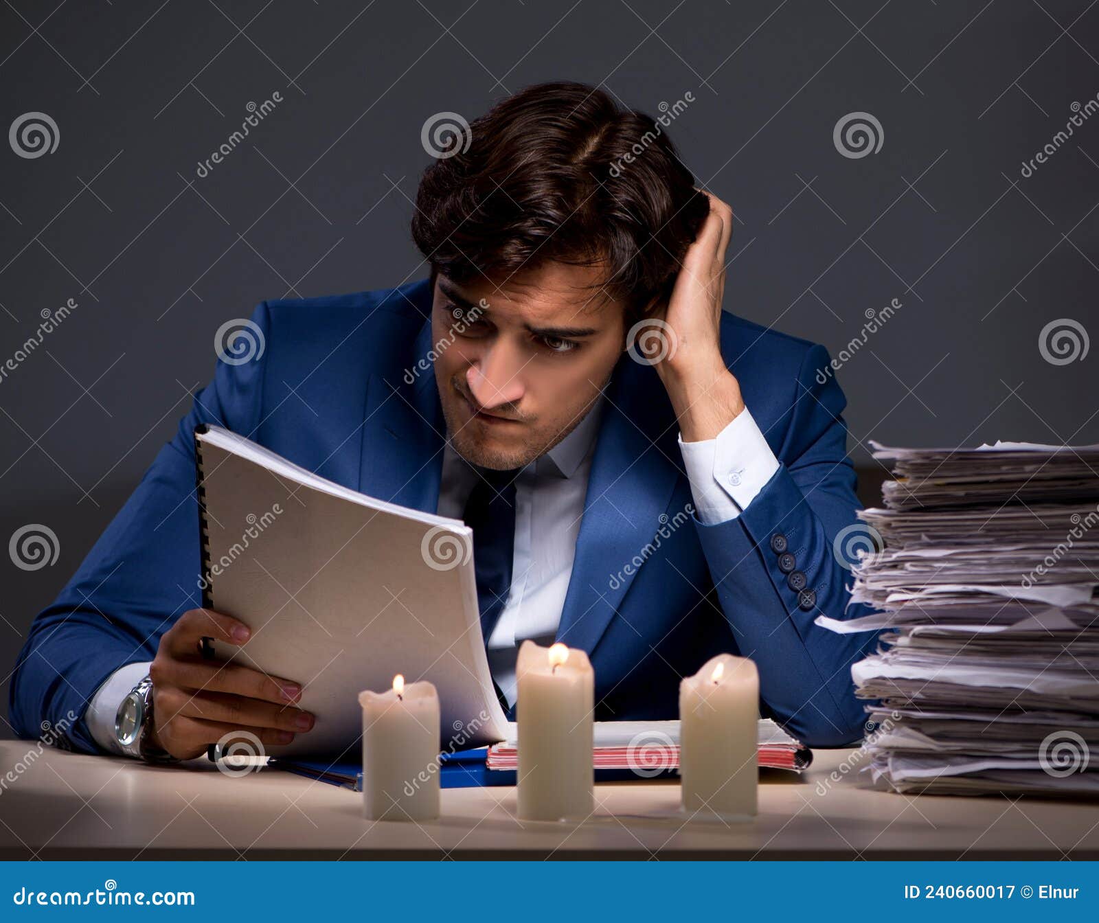 The Businessman Working Late in Office with Candle Light Stock Image ...