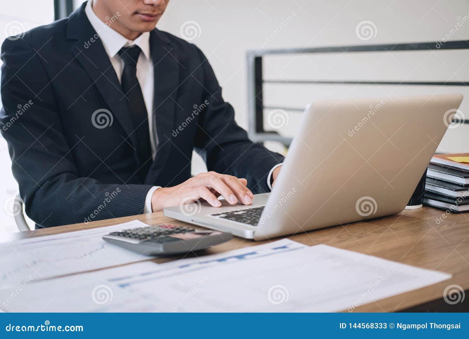 Businessman Working New Project on Laptop Computer with Report Document ...