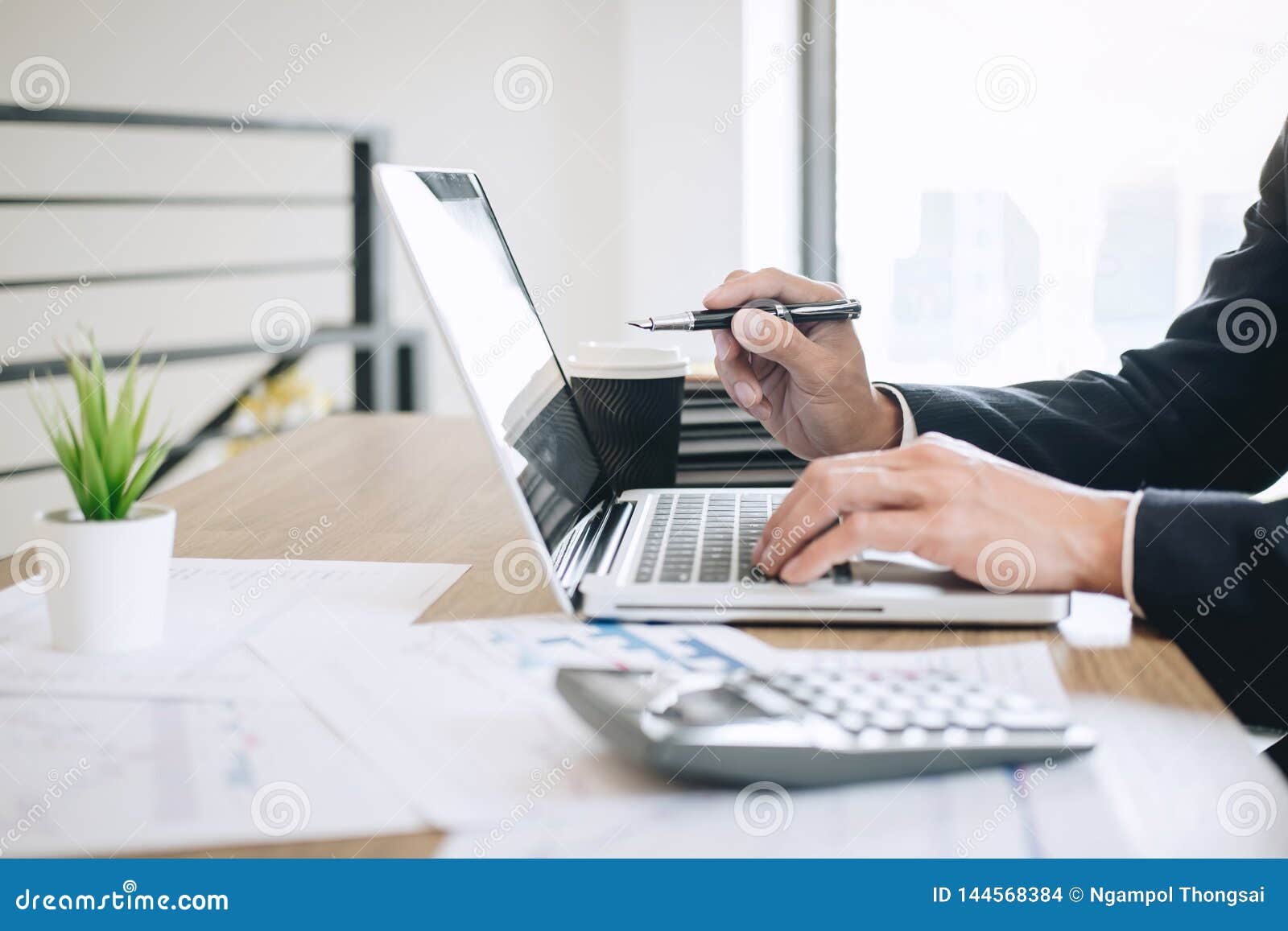 Businessman Working New Project on Laptop Computer with Report Document ...
