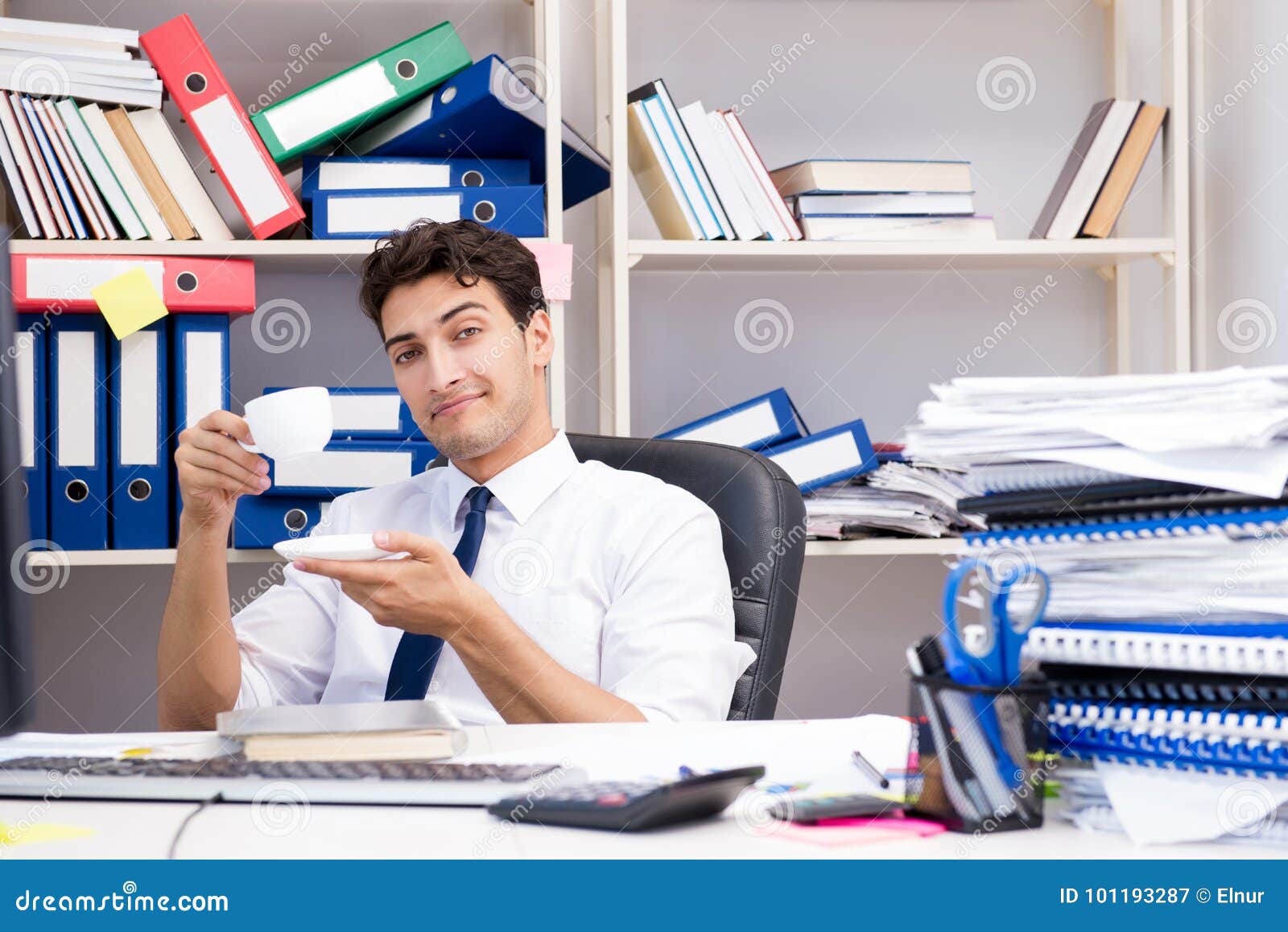 Businessman Working in the Office with Piles of Books and Papers Stock ...