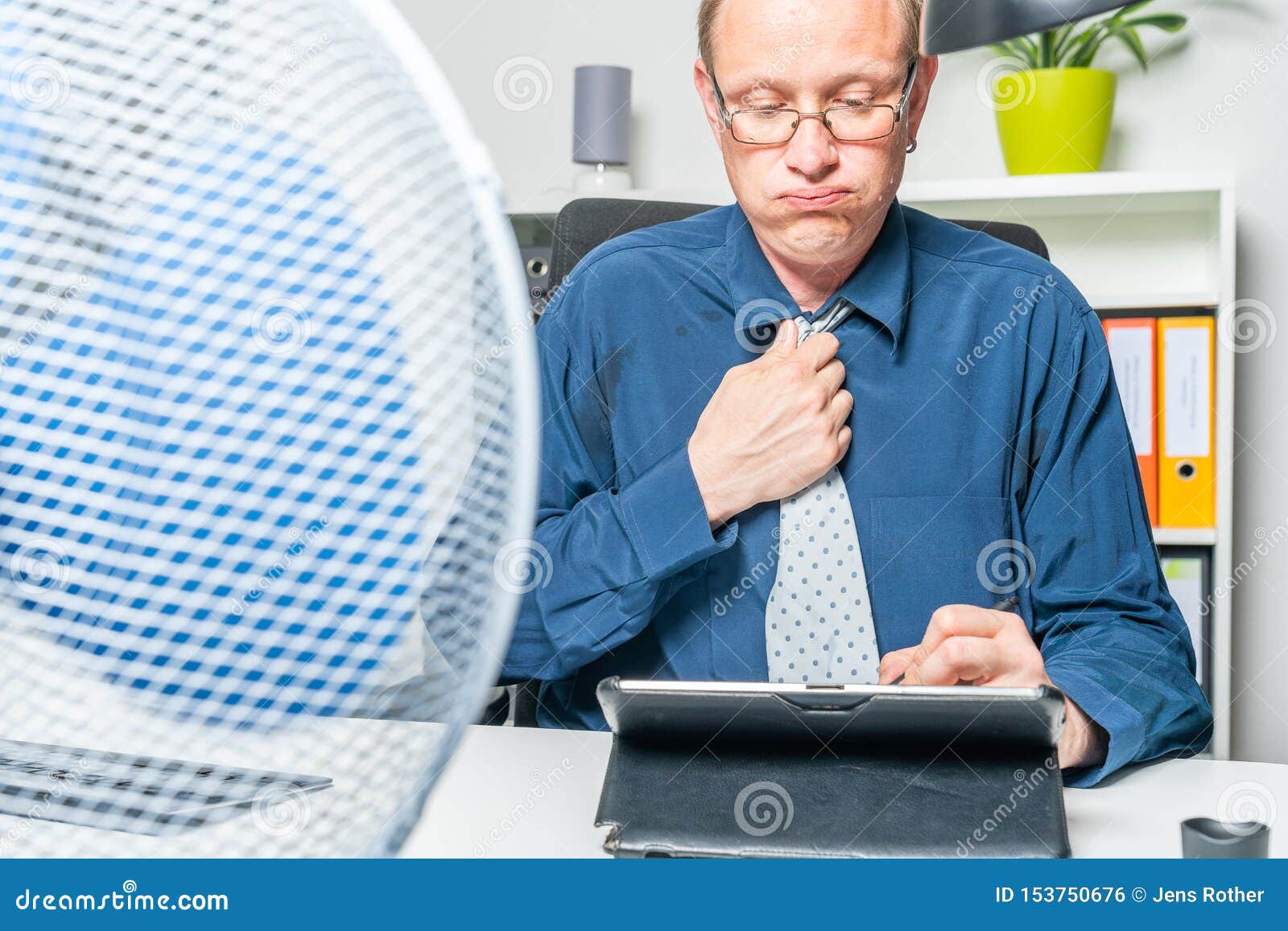 Businessman is Working in a Office and is Sweating Stock Photo - Image ...