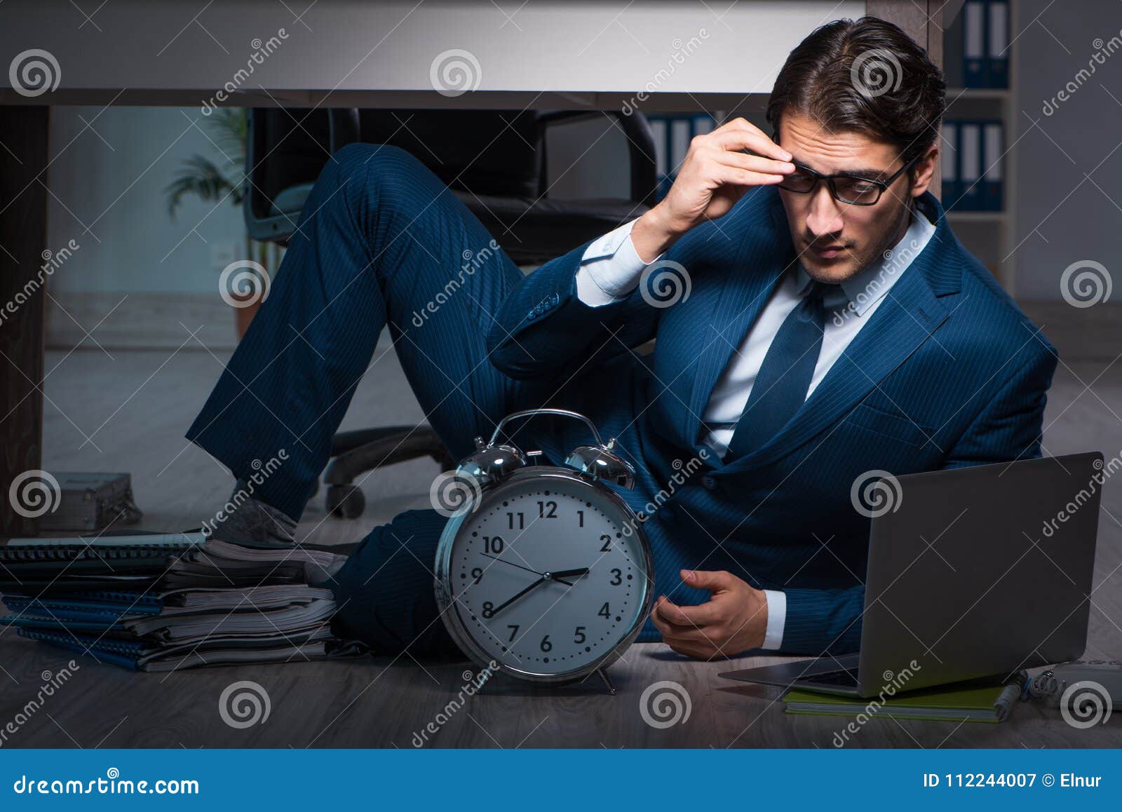 The Businessman Working Overtime Long Hours Late in Office Stock Image ... The Businessman Working Overtime Long Hours Late in Office Stock Image ...