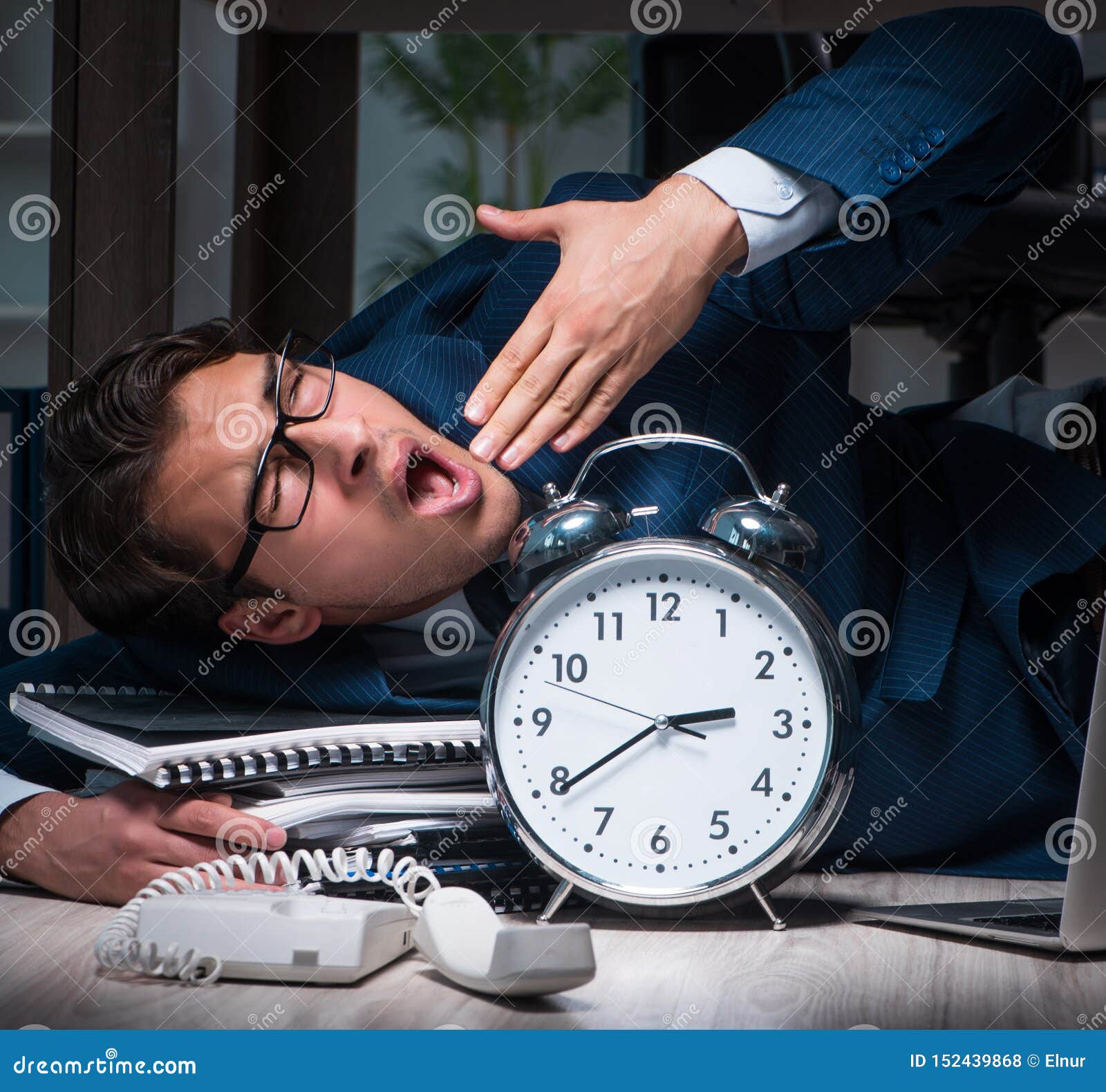 Businessman Working Overtime Long Hours Late in Office Stock Photo ... Businessman Working Overtime Long Hours Late in Office Stock Photo ...