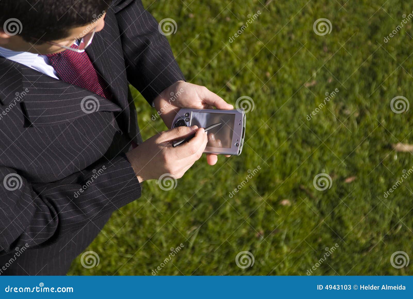 Businessman Working with a Palmtop Stock Image - Image of object ...