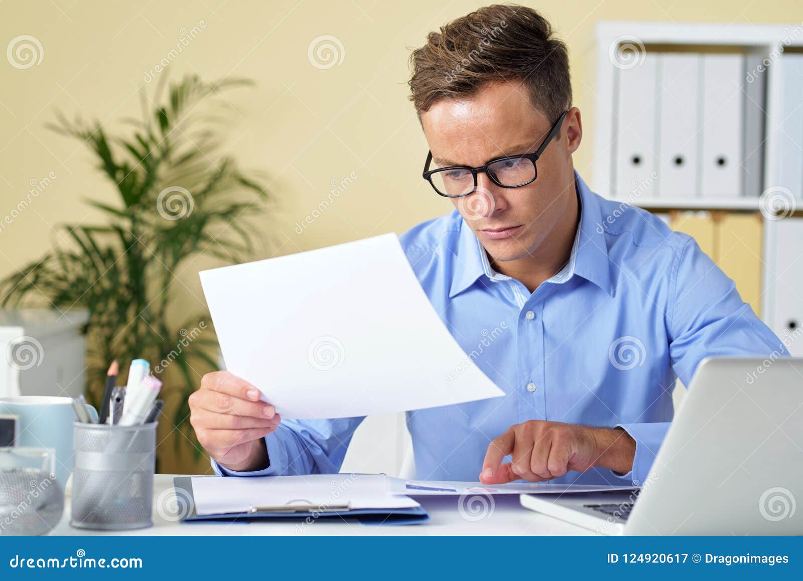 Businessman Working with Papers Stock Image - Image of typing, busy ...