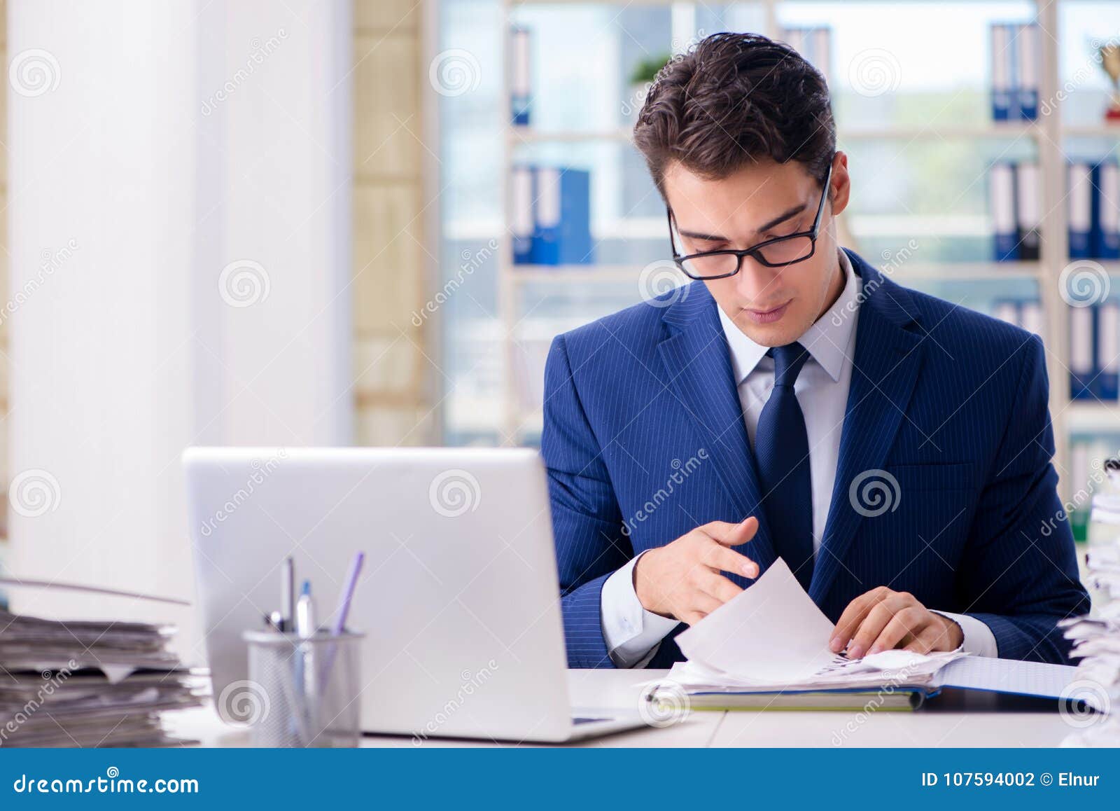 The Businessman Working with Paperwork in the Office Stock Photo ...