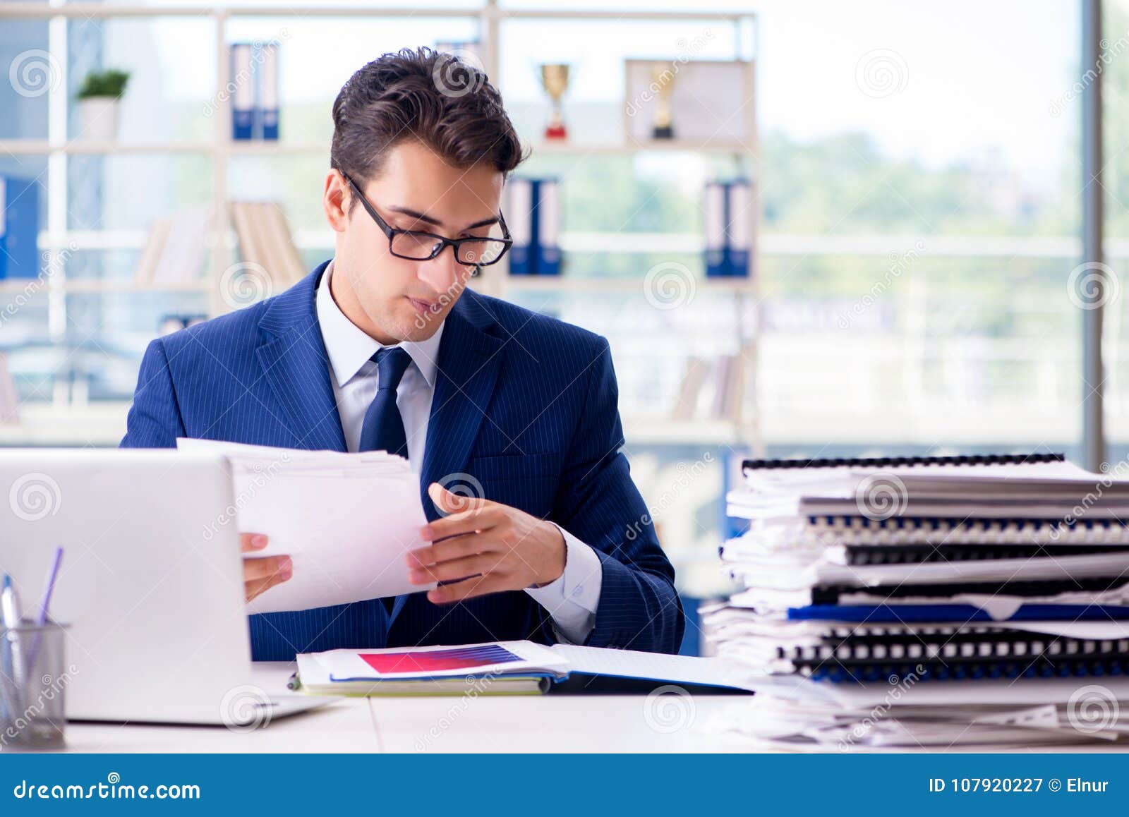The Businessman Working with Paperwork in the Office Stock Image ...
