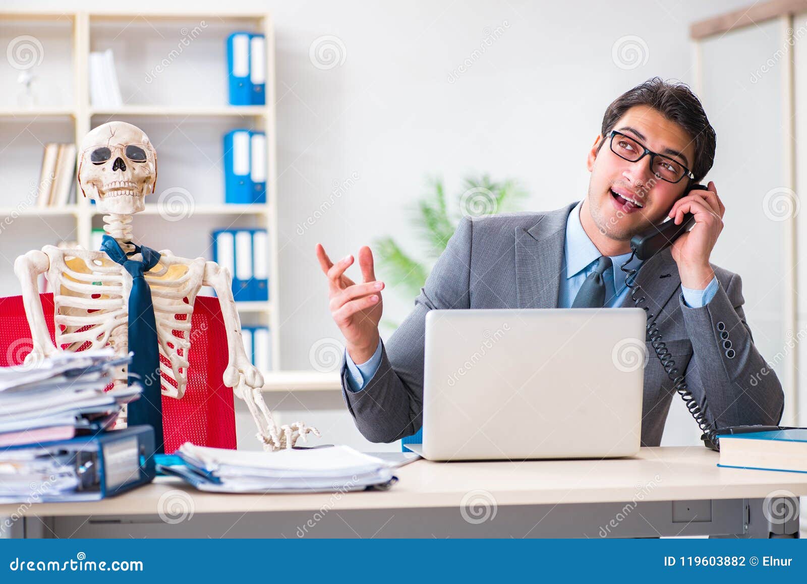 The Businessman Working with Skeleton in Office Stock Photo - Image of ...