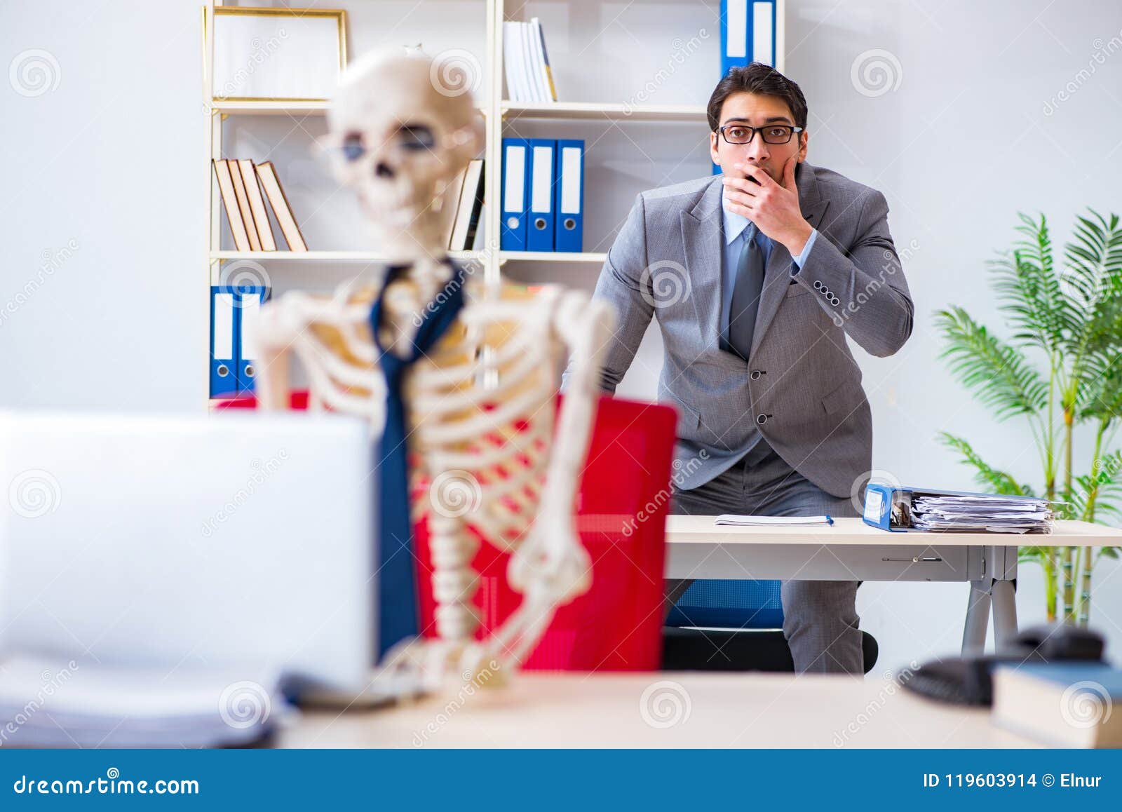 The Businessman Working with Skeleton in Office Stock Photo - Image of ...