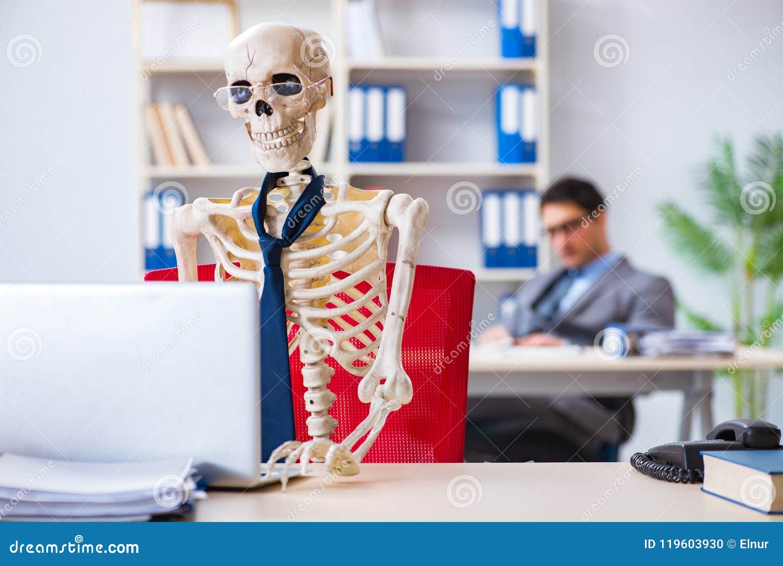 The Businessman Working with Skeleton in Office Stock Photo - Image of ...