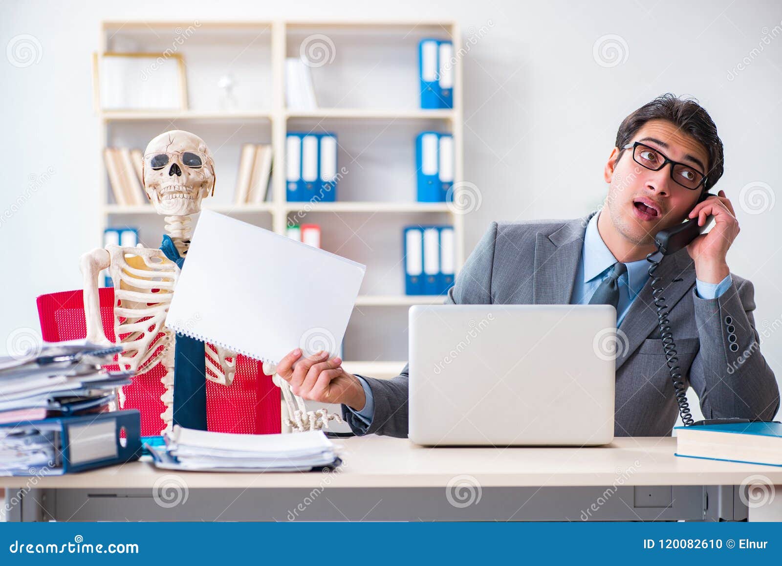 The Businessman Working with Skeleton in Office Stock Photo - Image of ...